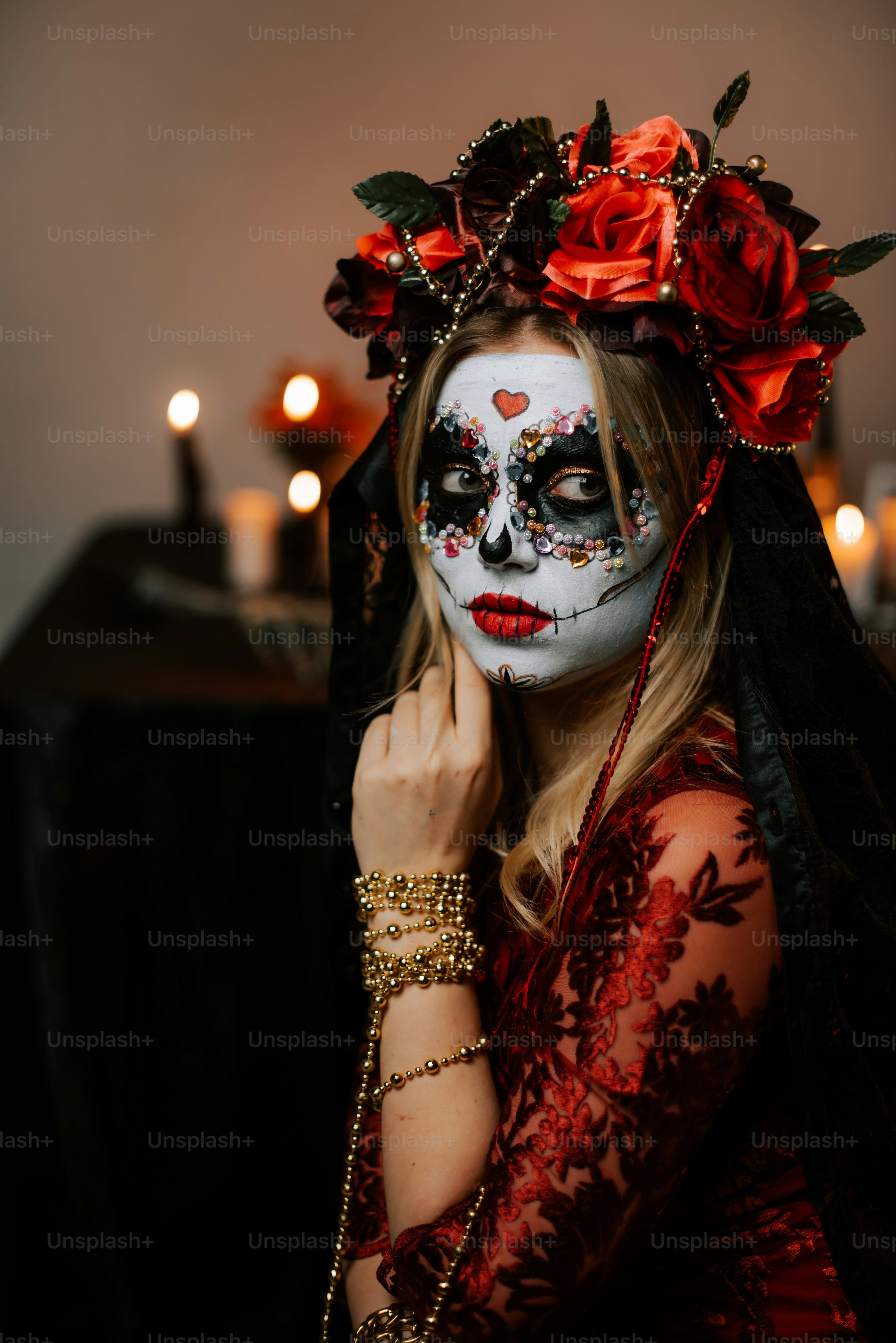 A woman in a red dress with a skeleton face paint photo – Day of the ...