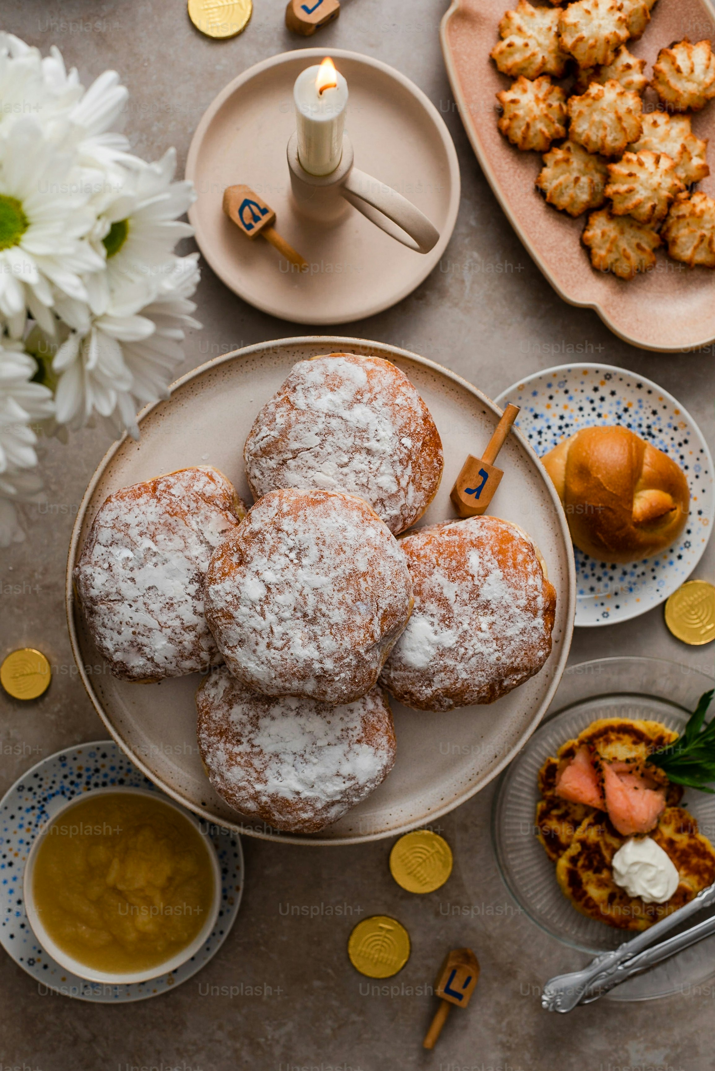 A table topped with plates of food and a cup of tea photo – Jewish ...