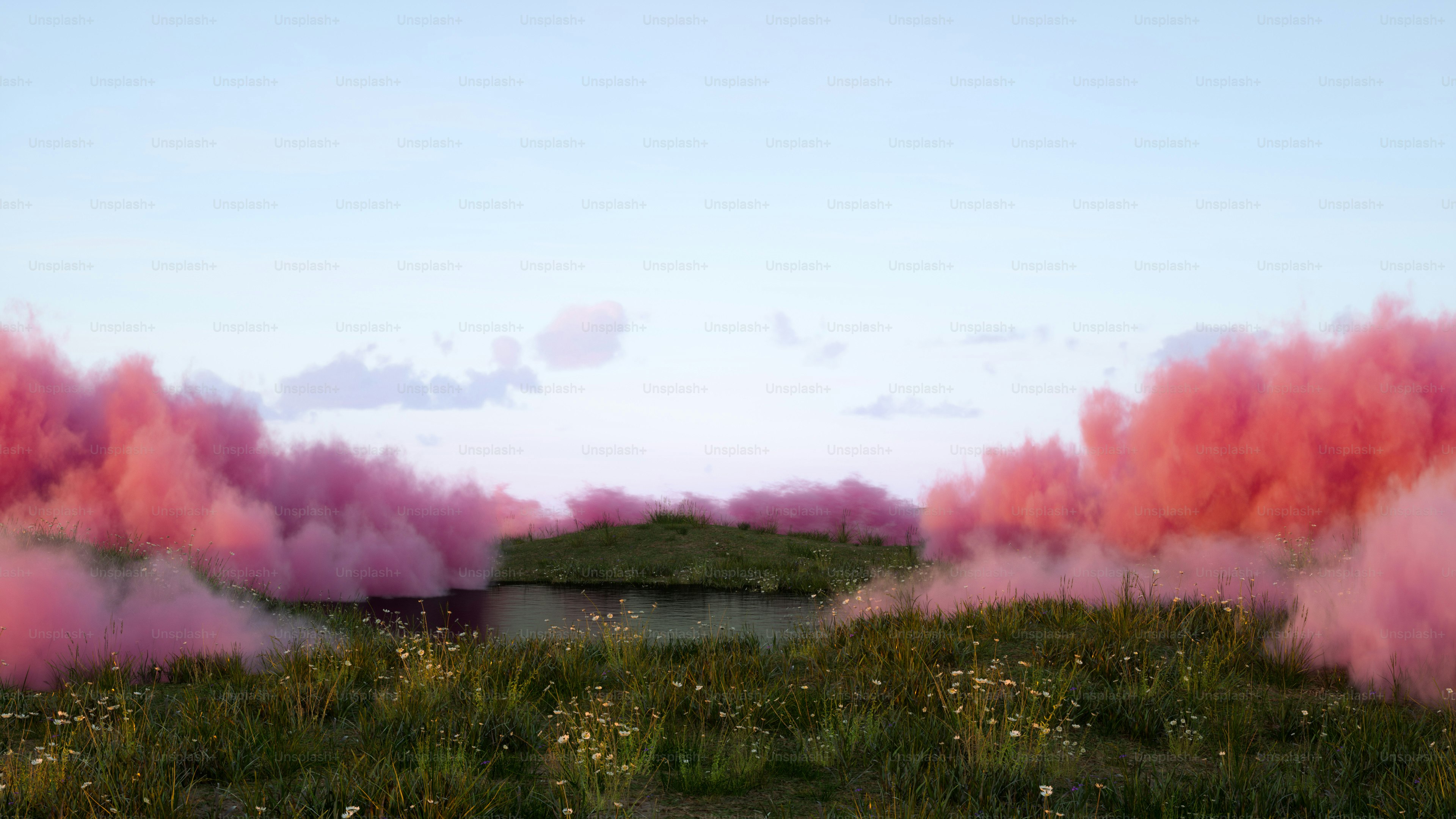 A field with pink smoke coming out of it photo – Clouds Image on Unsplash