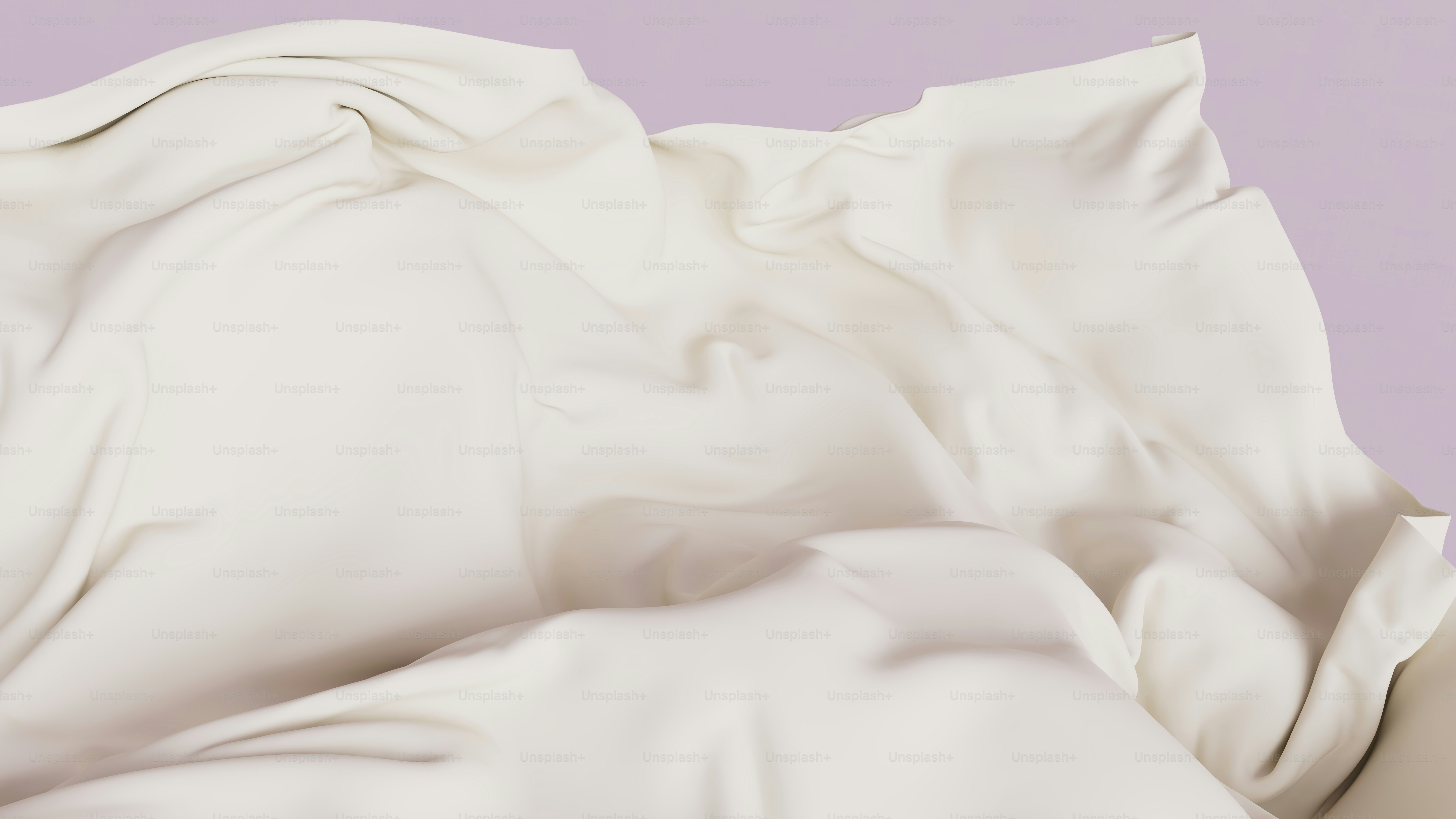 A close up of a white sheet on a bed photo – Wallpaper Image on Unsplash