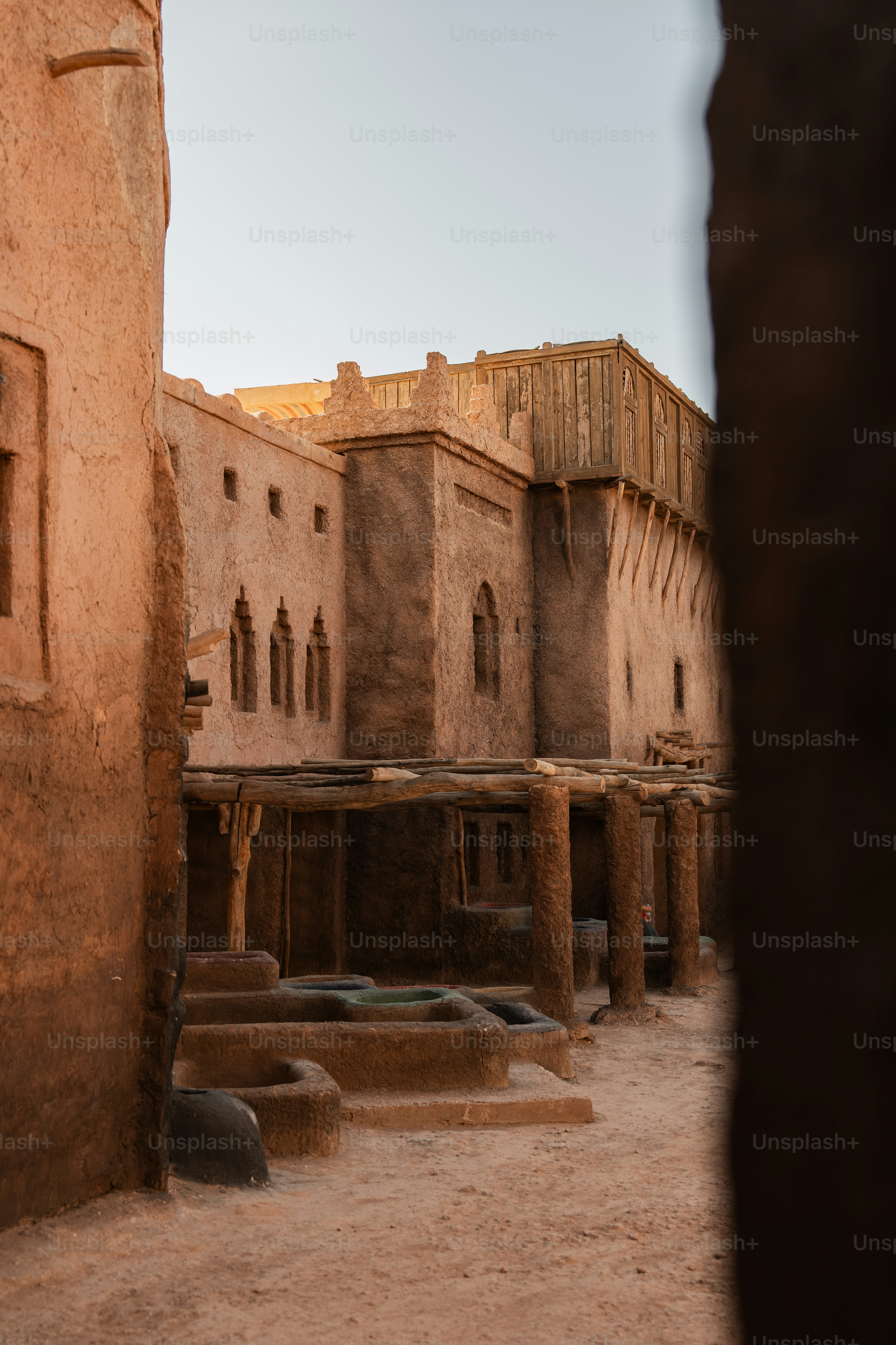 An old building with steps leading up to it photo – Covered Image on ...