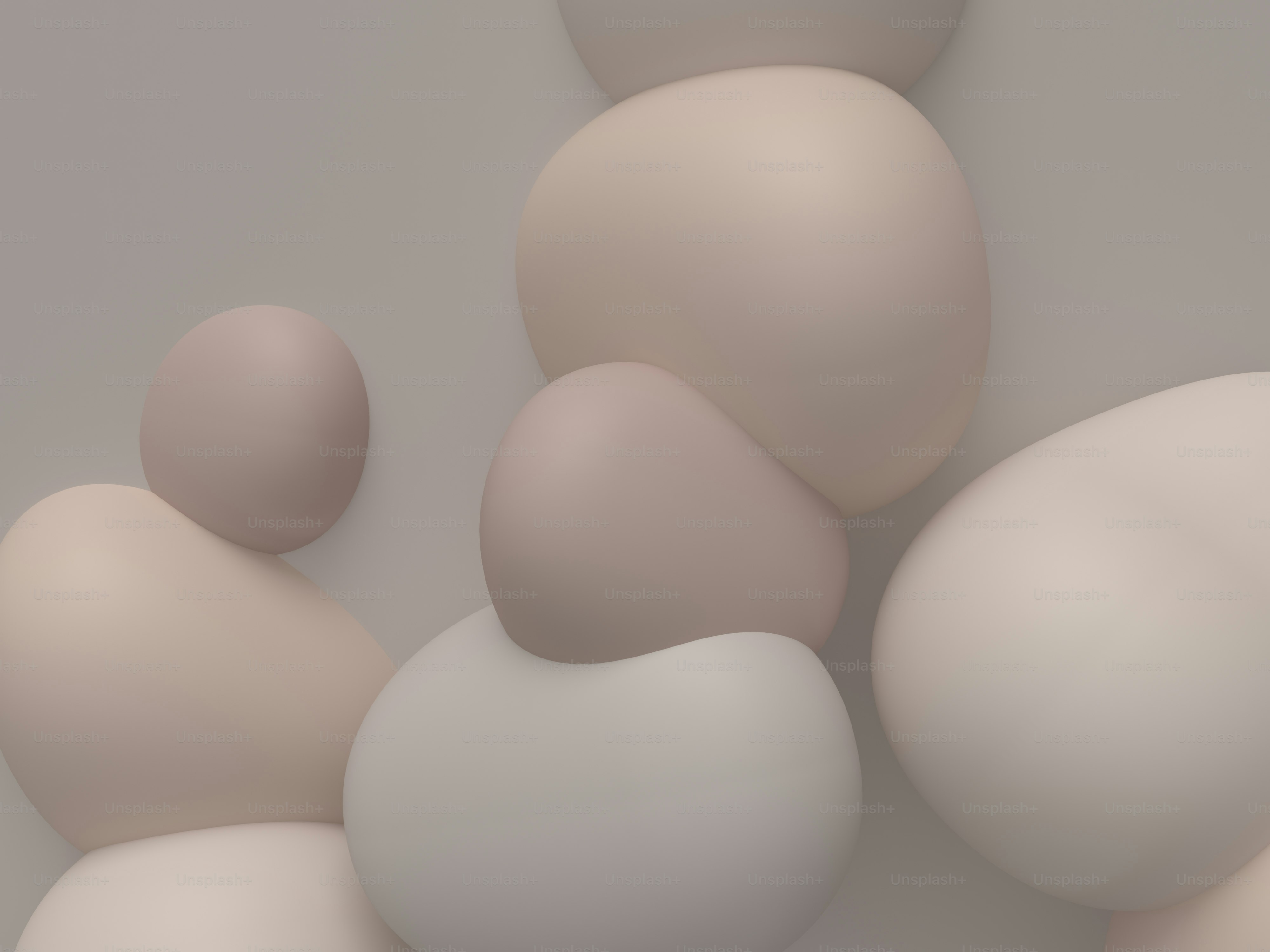 A group of white and beige balls on a gray background photo ...
