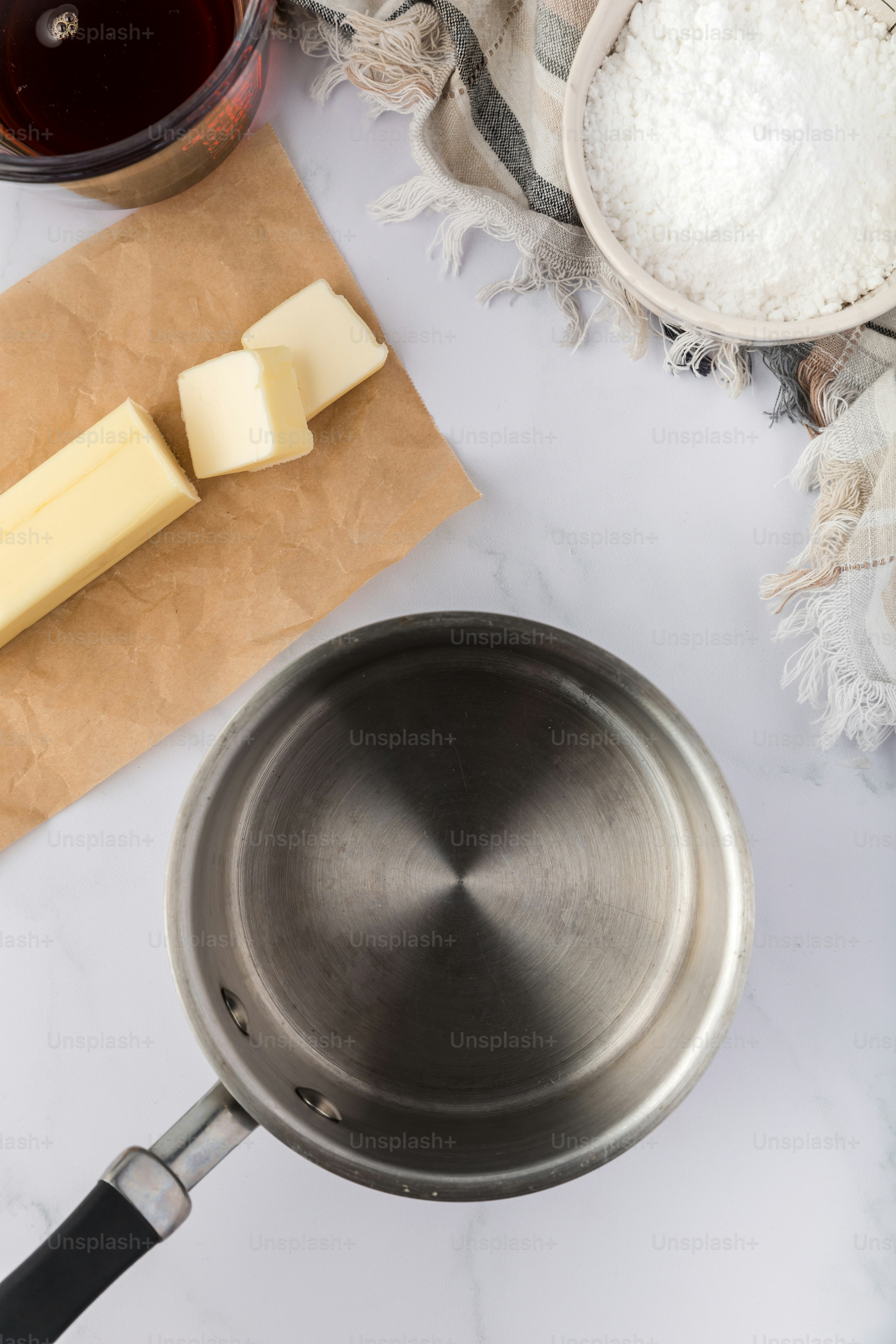 A pan with a piece of butter next to it photo – Butter Image on Unsplash