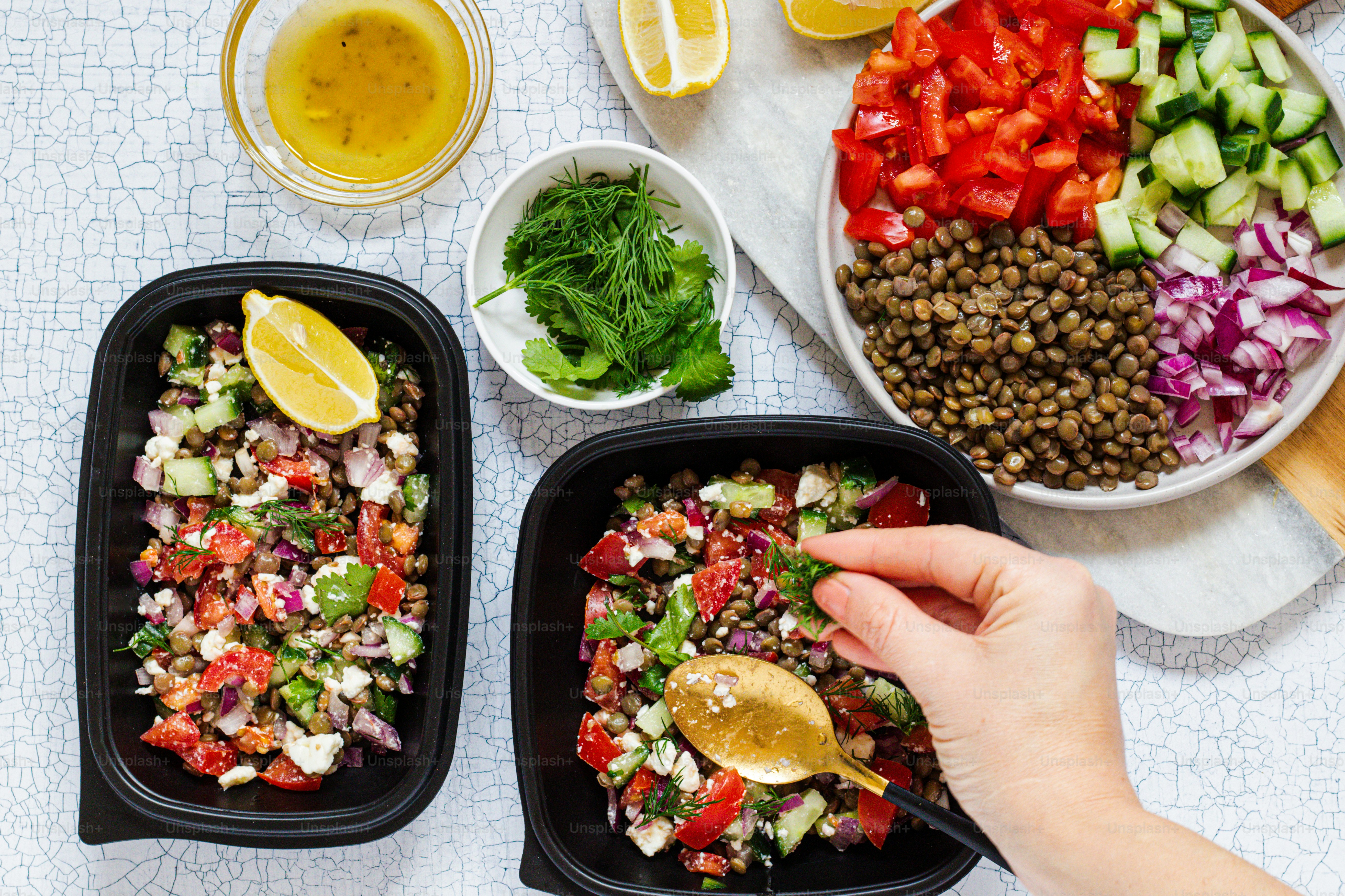 A table topped with two trays of food photo – Meal prep Image on Unsplash
