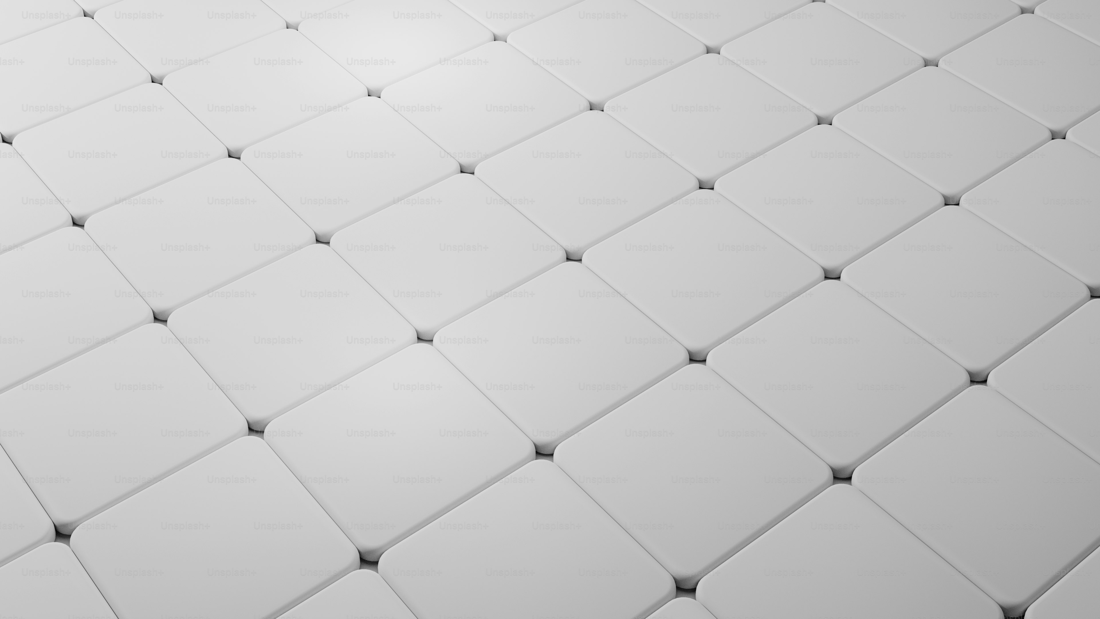 A close up view of a white tile wall photo – Wallpaper Image on Unsplash