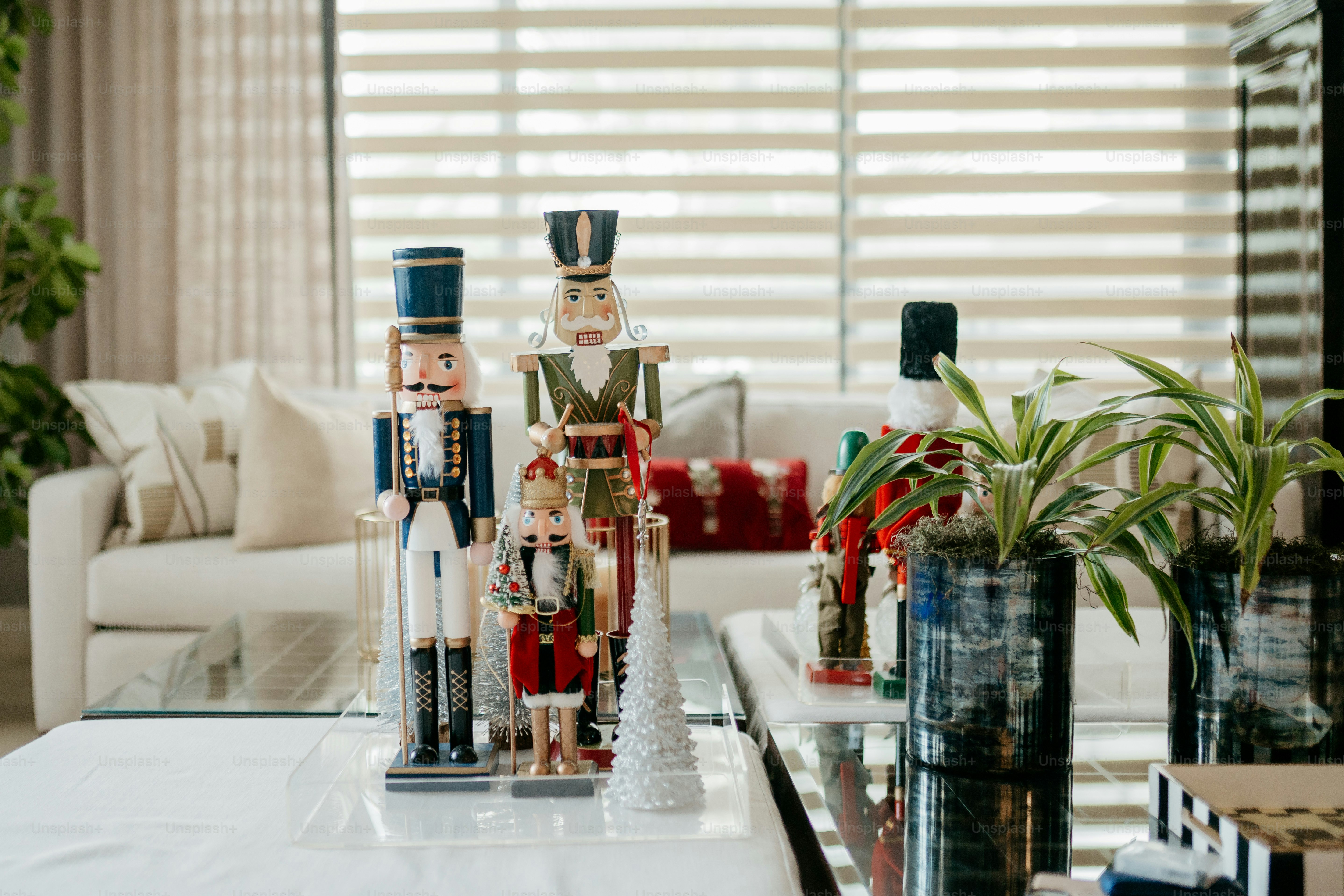 A living room filled with lots of wooden nutcrackers photo – Christmas ...