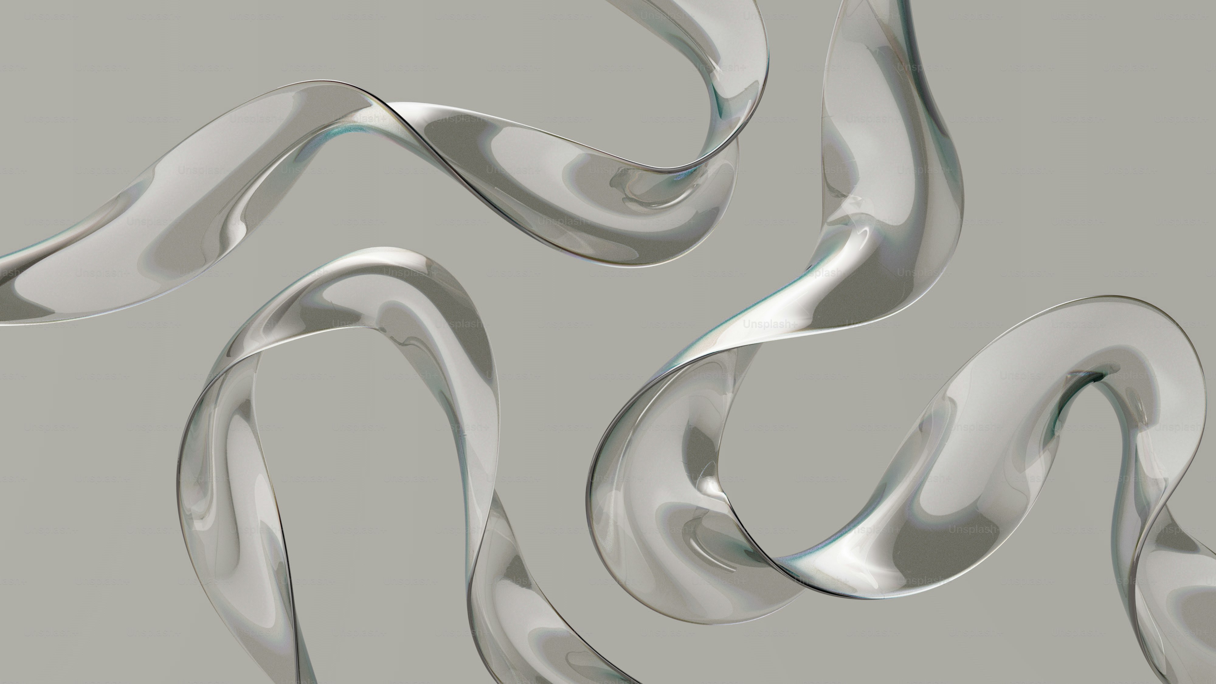 A group of shiny metal objects on a gray background photo – Wallpaper ...