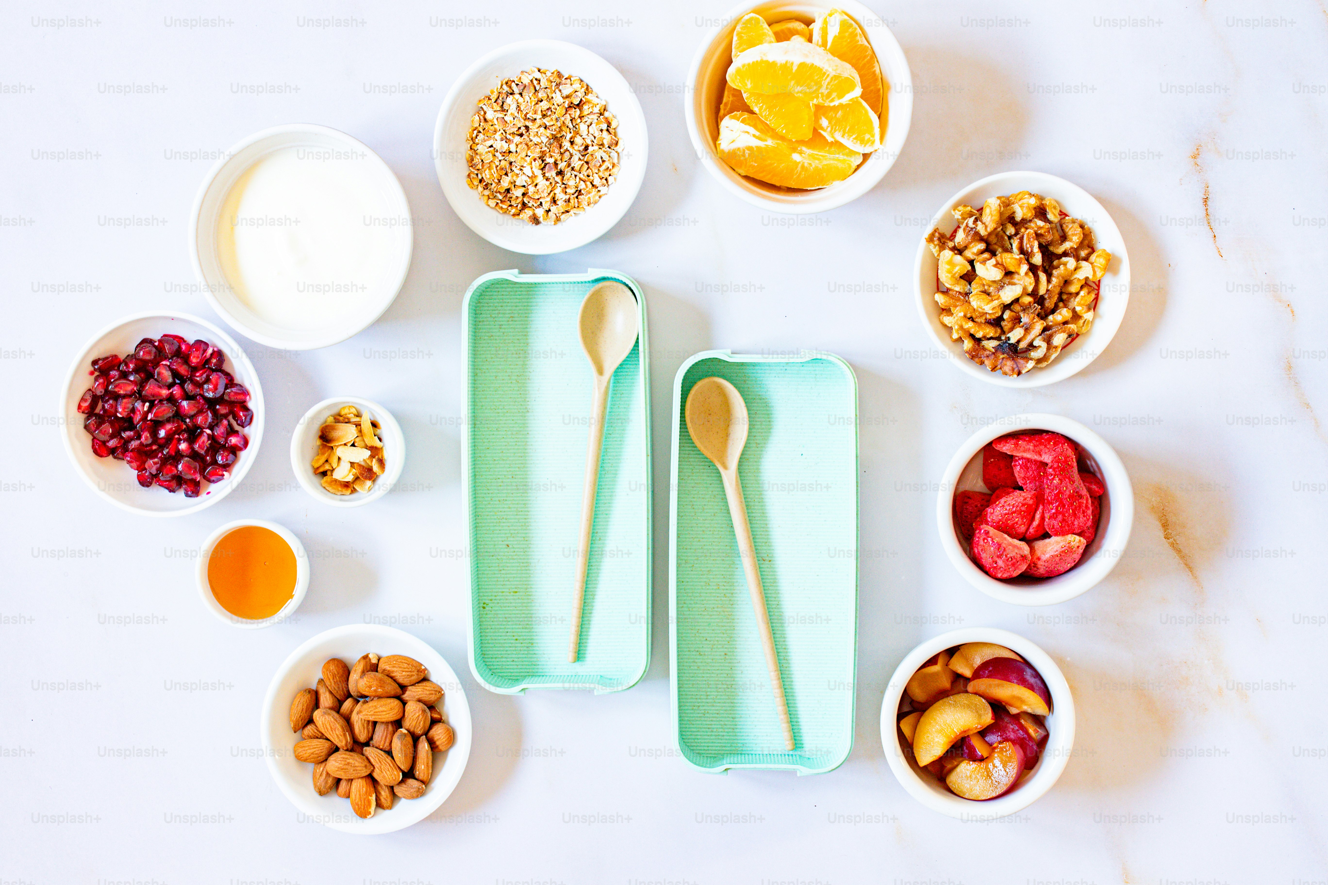 A table topped with bowls of fruit and nuts photo – Fruits Image on ...