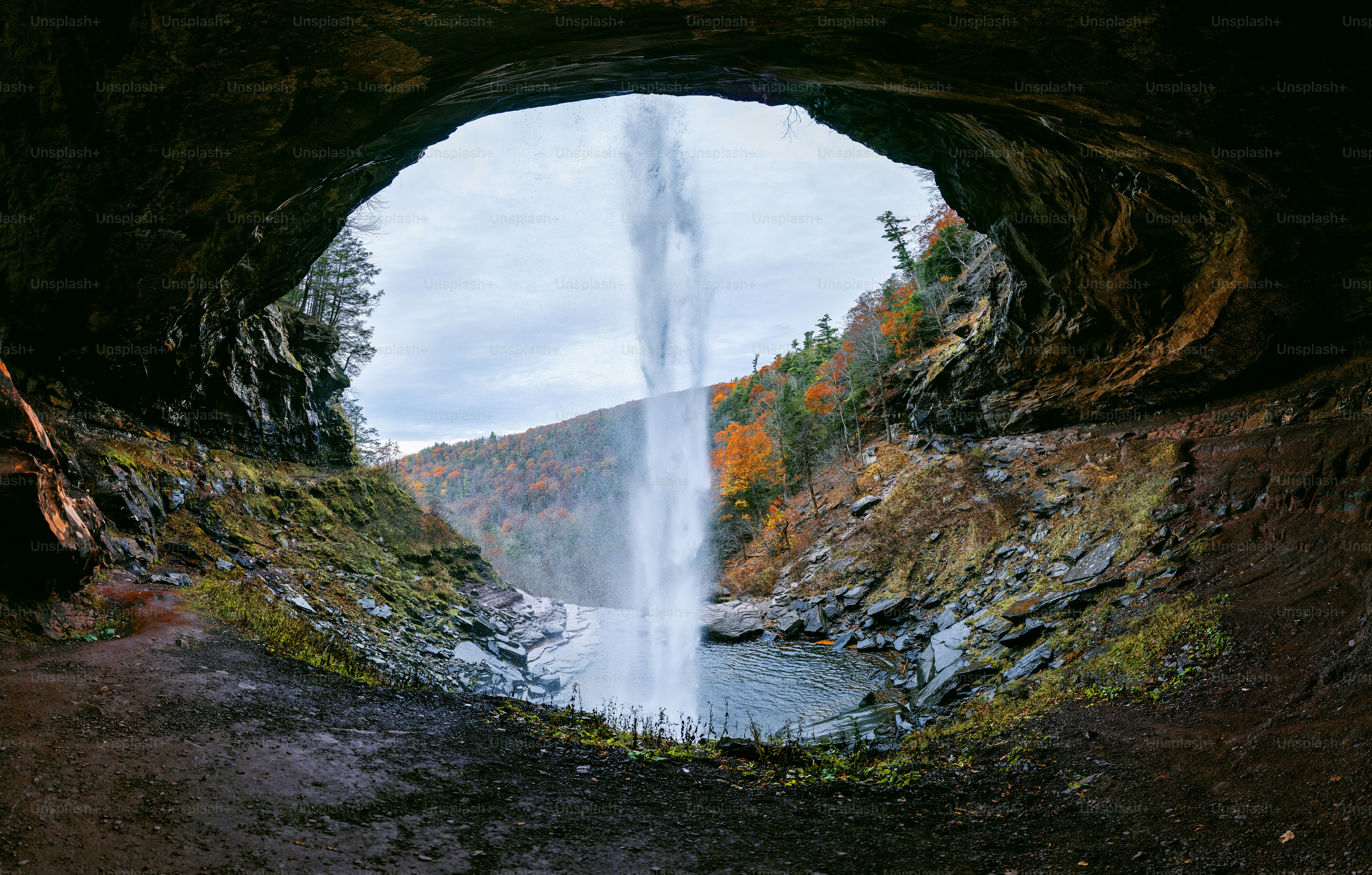 A view of a waterfall from inside a cave photo – Kaaterskill falls Image on Unsplash