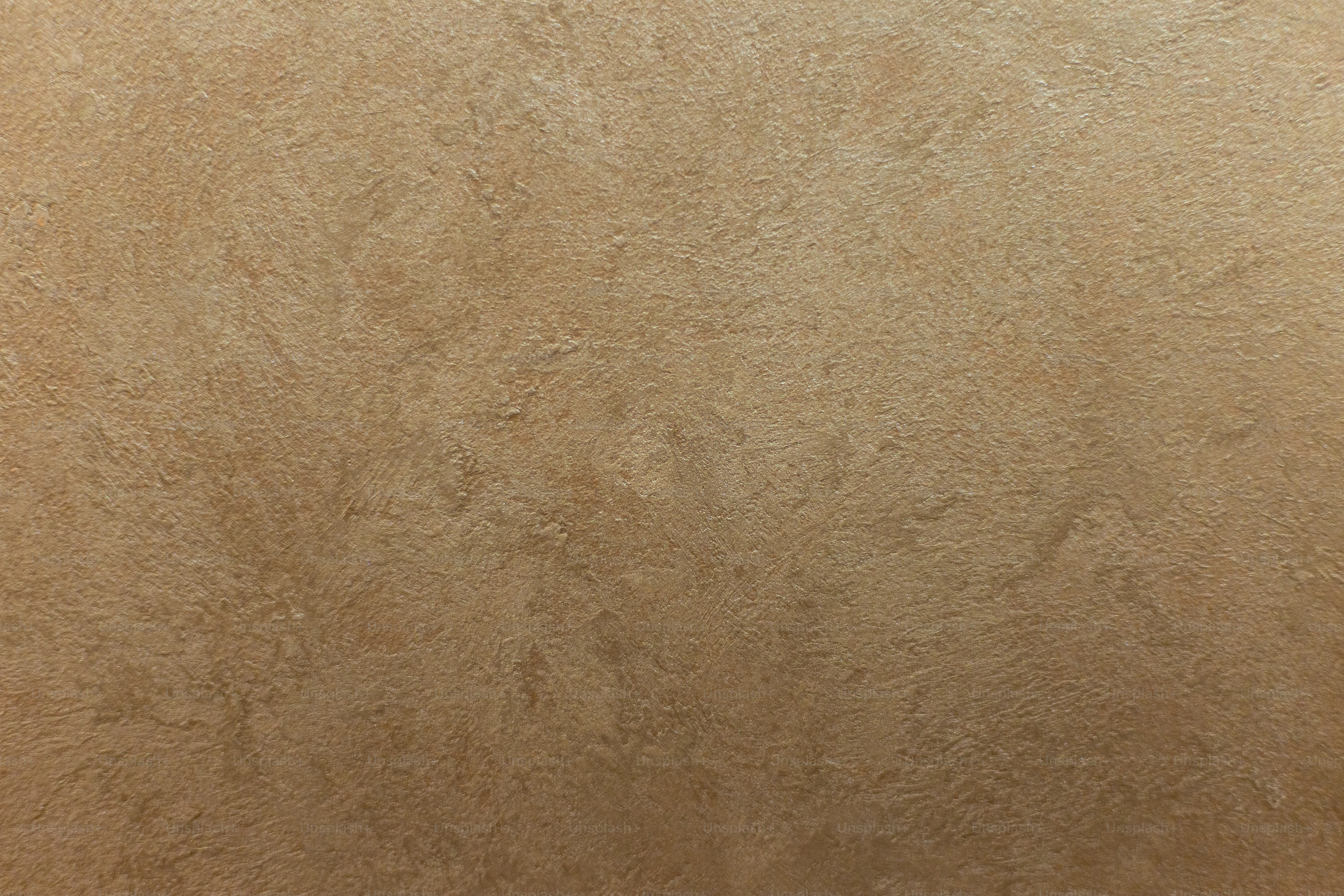 A close up of a tan colored wall photo – Texture Image on Unsplash