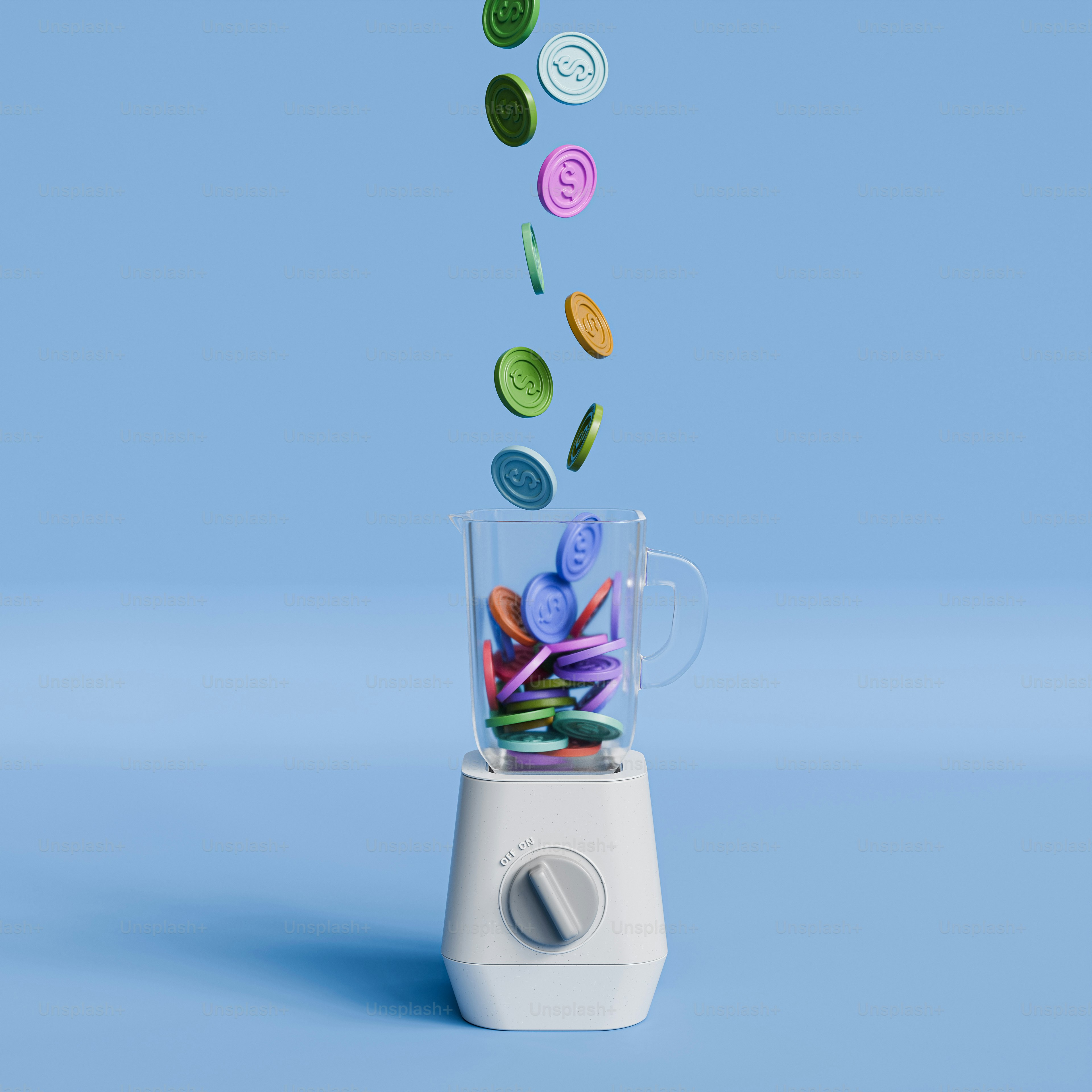 A blender filled with lots of different colored buttons photo ...