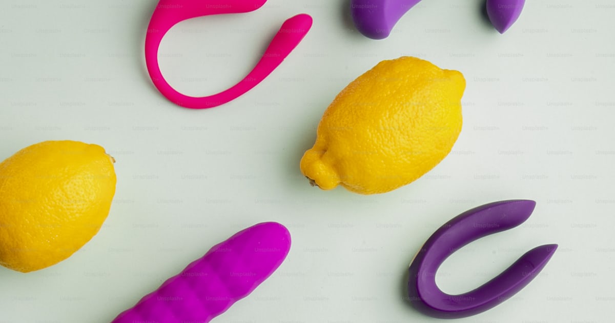 A Group Of Different Colored Toys On A Table Photo Clitoris