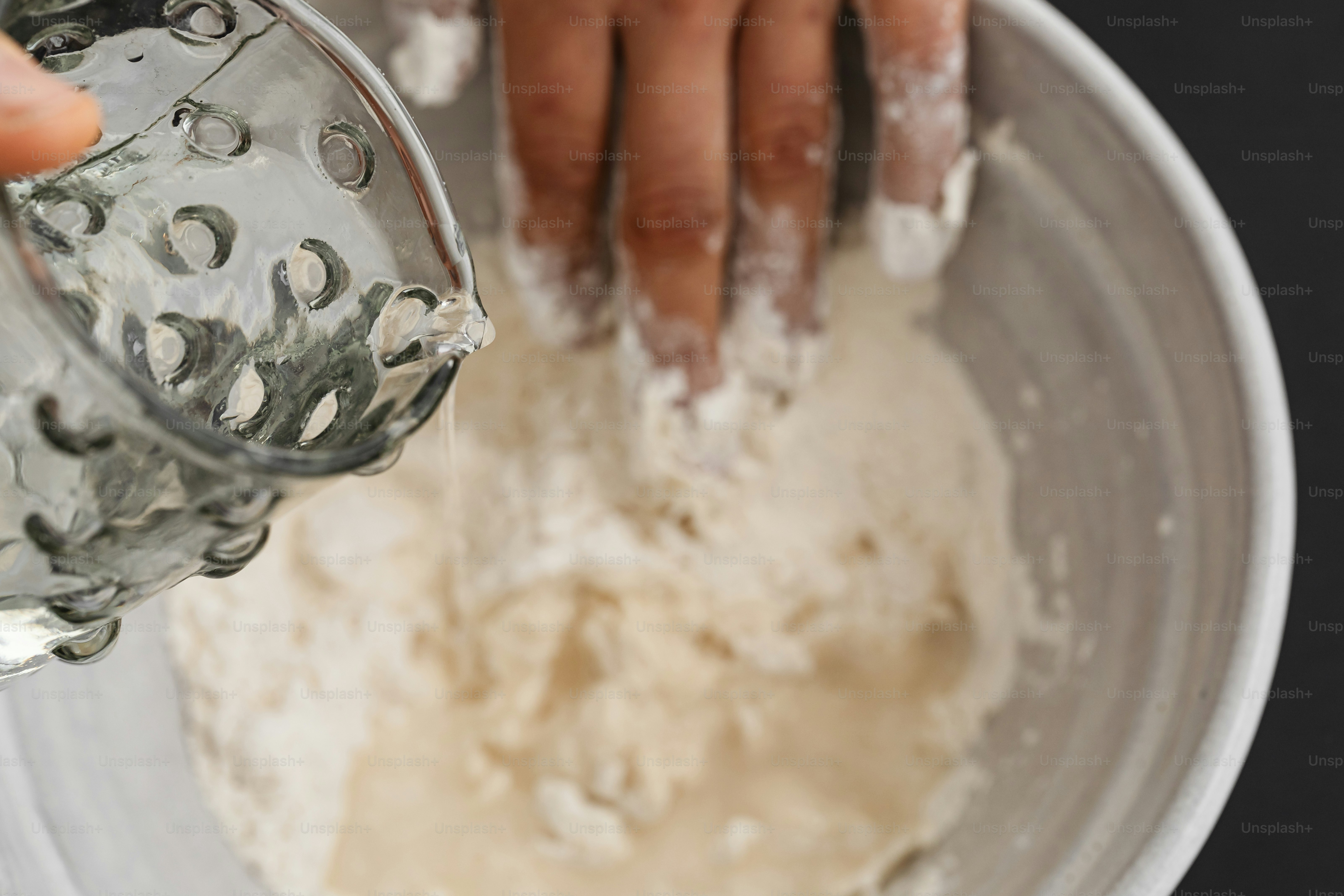 A person is mixing something in a bowl photo – Food Image on Unsplash