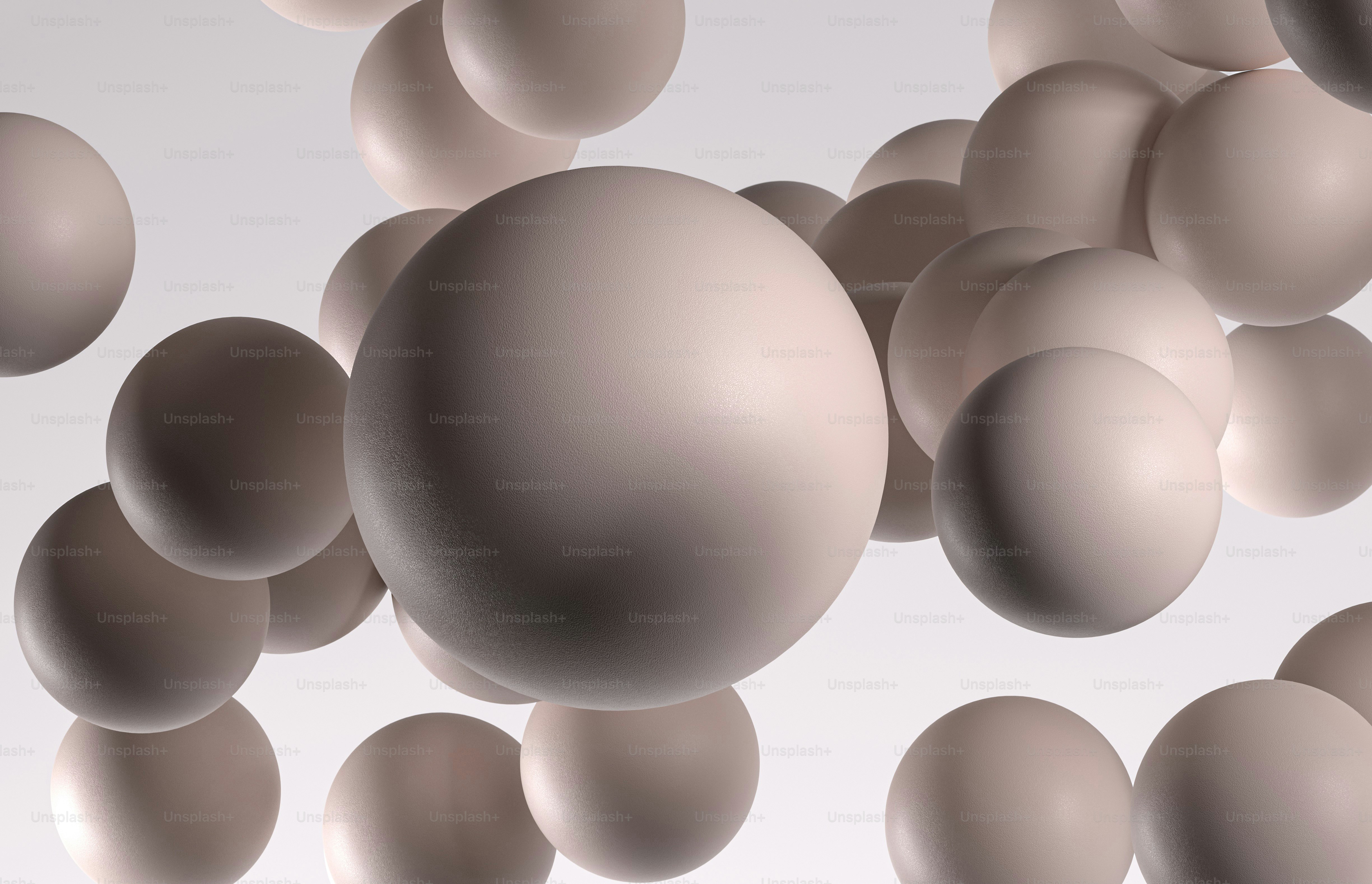 A bunch of balls floating in the air photo – Beige Image on Unsplash