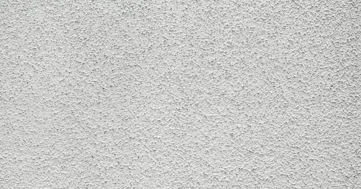 흰색 치장 벽토 벽의 클로즈업 사진 Unsplash의 텍스처 이미지
