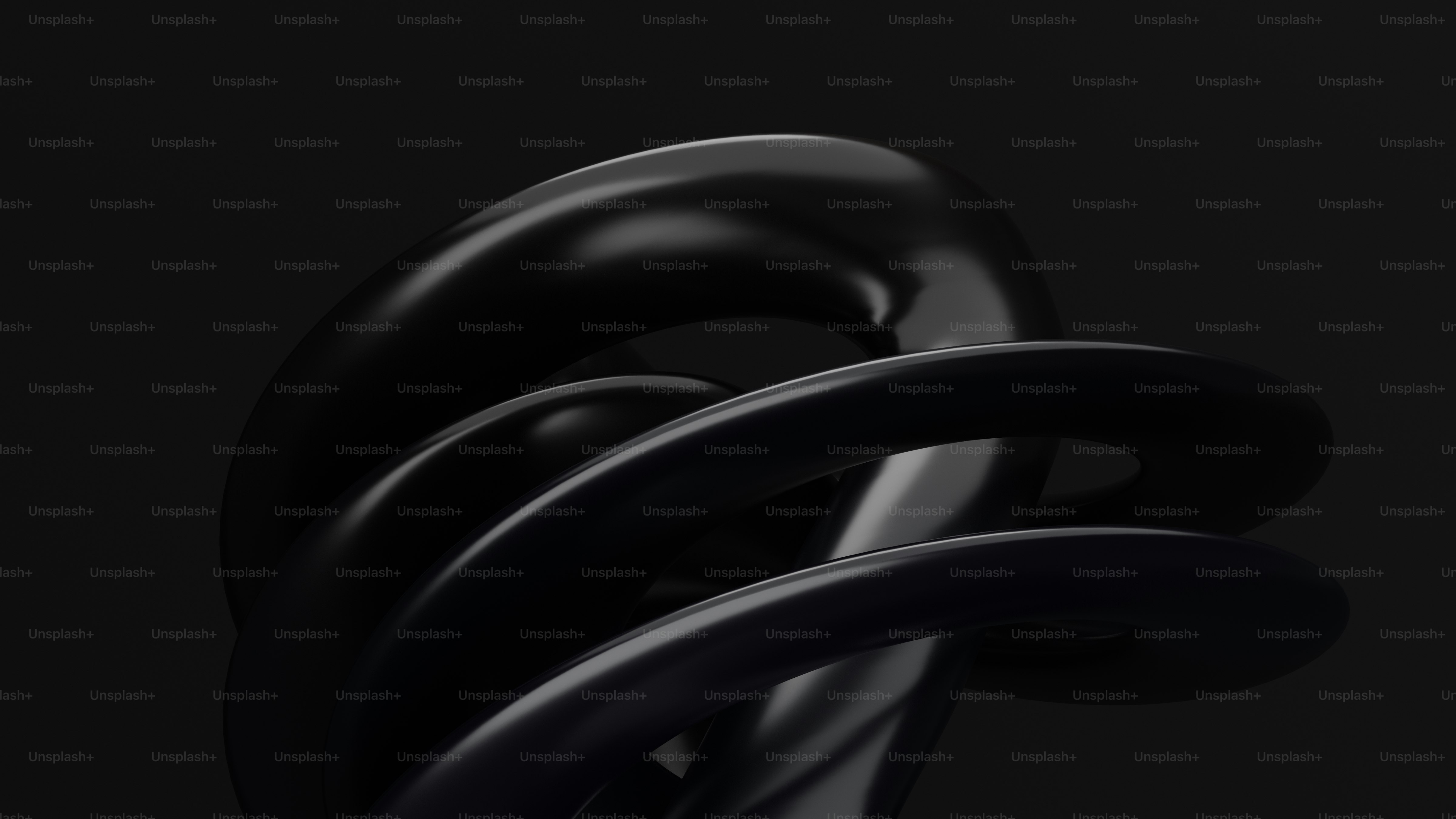 A close up of a black object on a black background photo – Dark mode ...