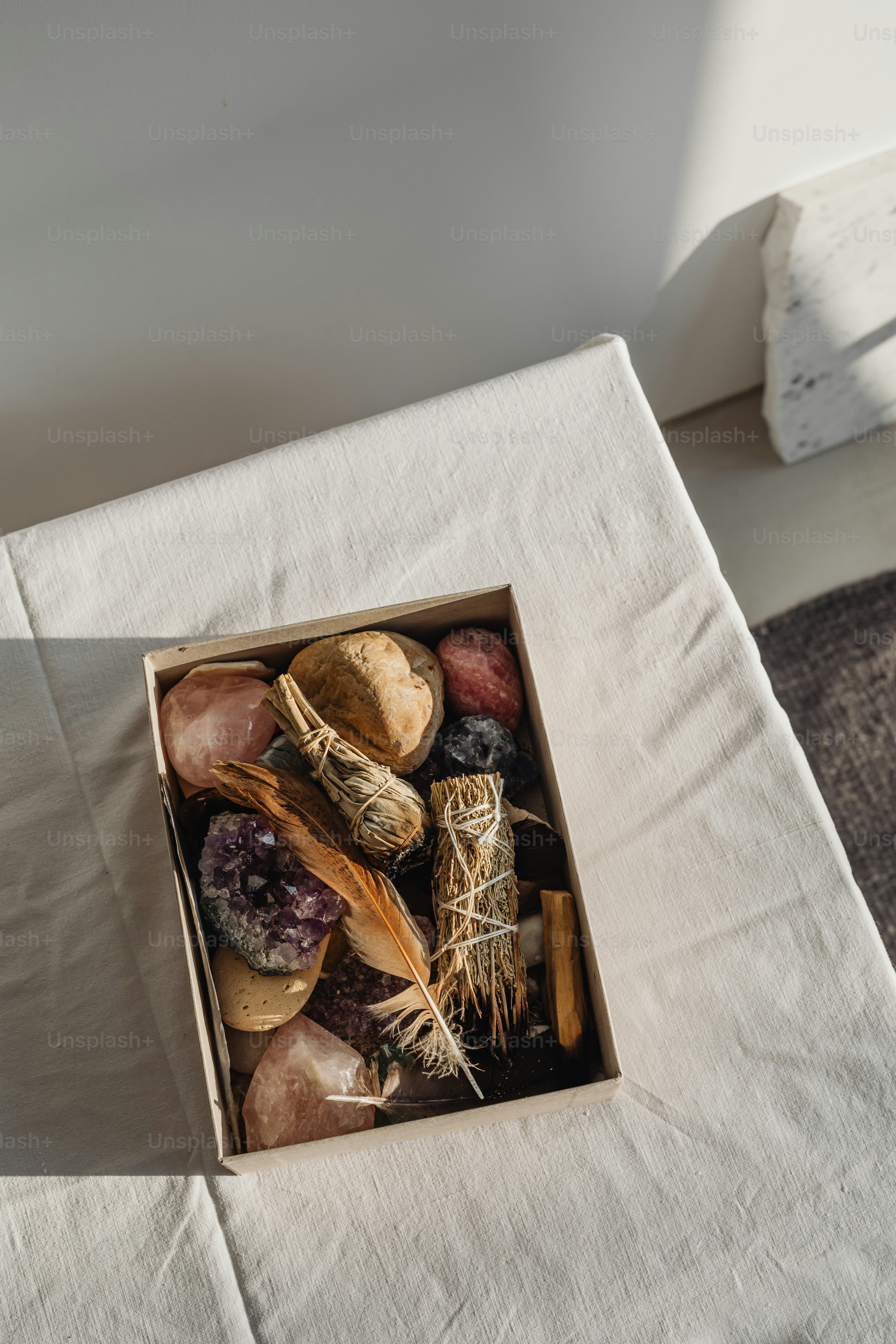 A couple of rocks sitting on top of a table photo – Crystals Image on ...