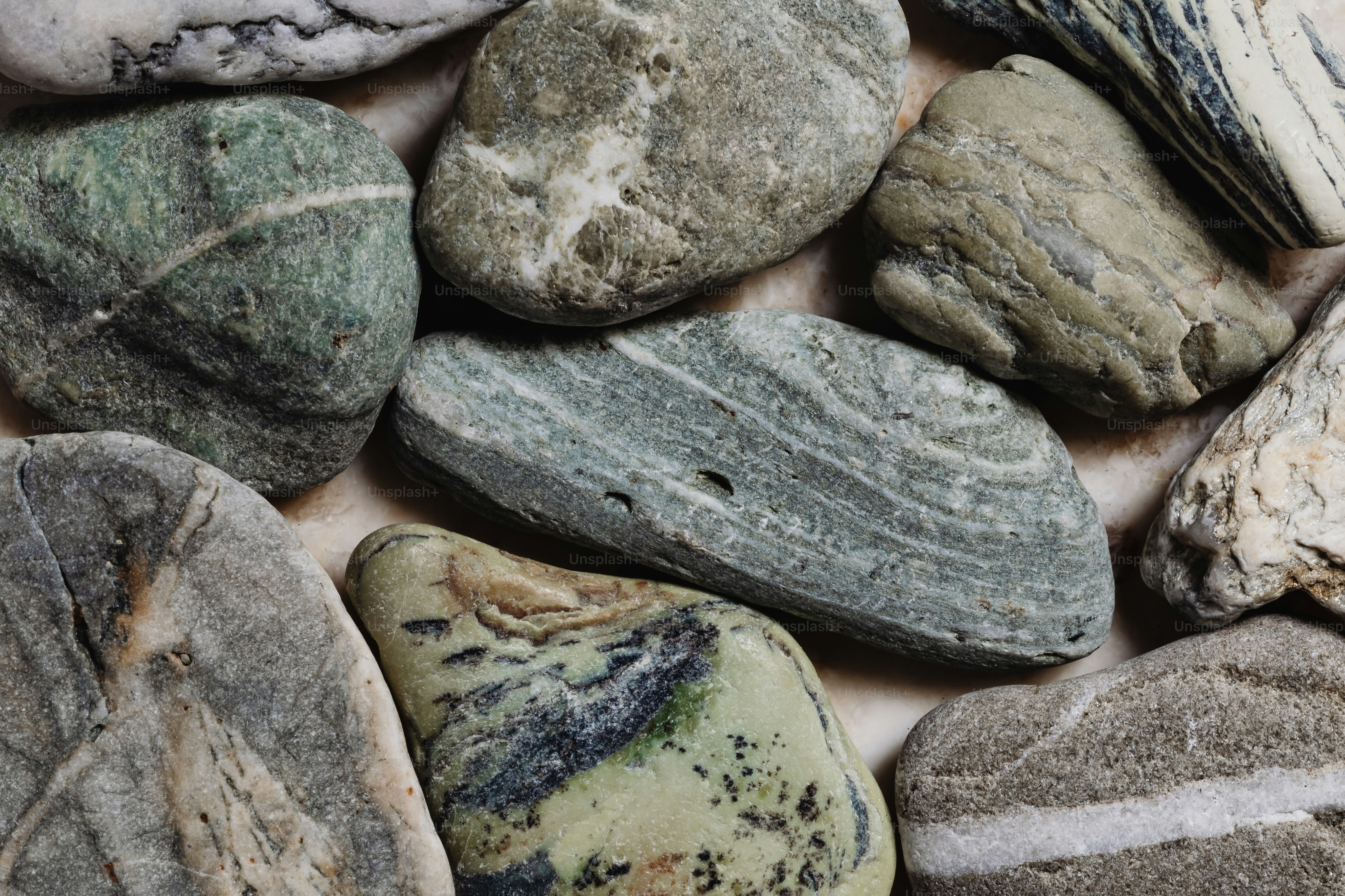 A bunch of rocks sitting on top of each other photo – Pebbles Image on ...