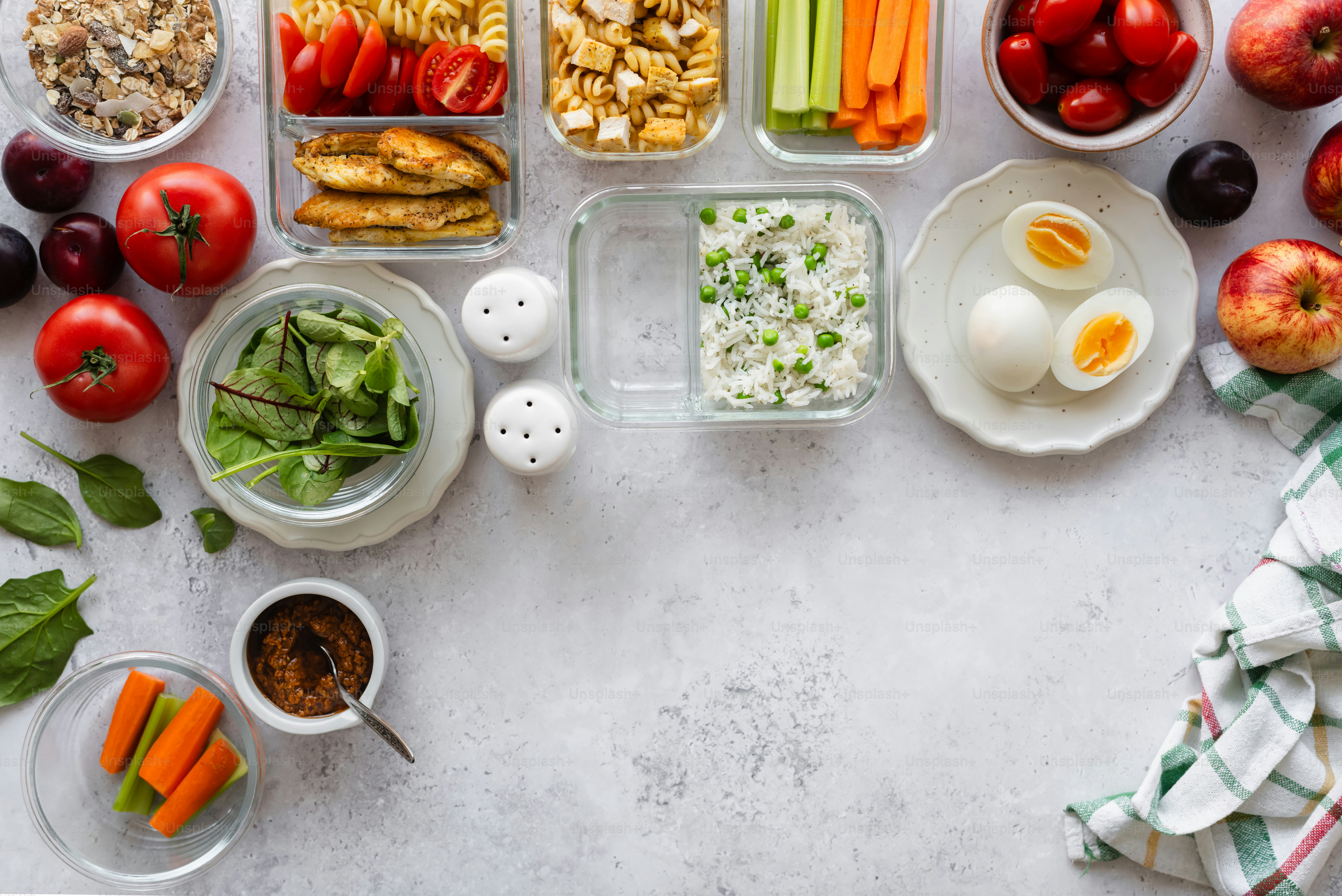 A table topped with lots of different types of food photo – Food prep ...