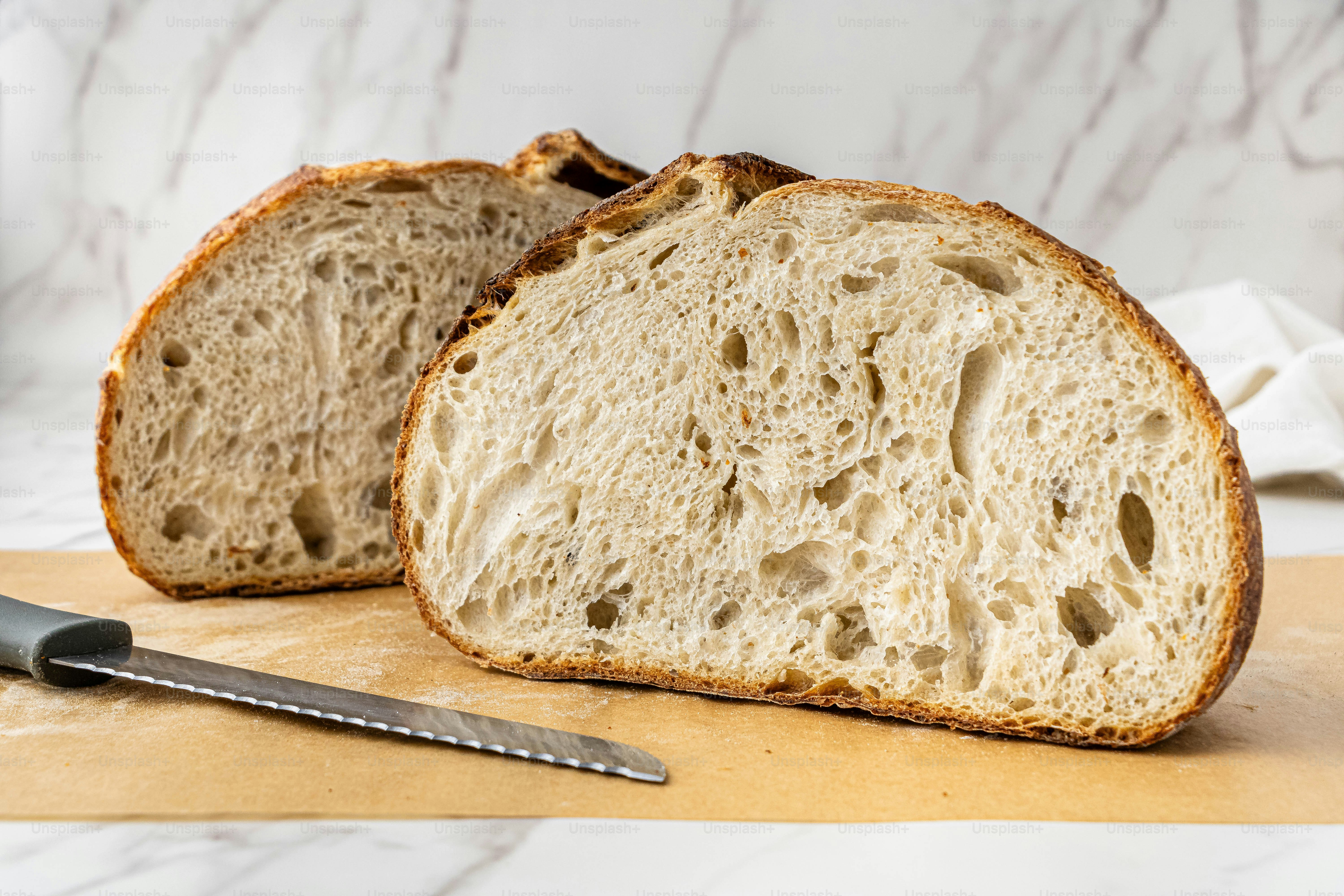A close up of a piece of bread with a knife photo – Food Image on Unsplash
