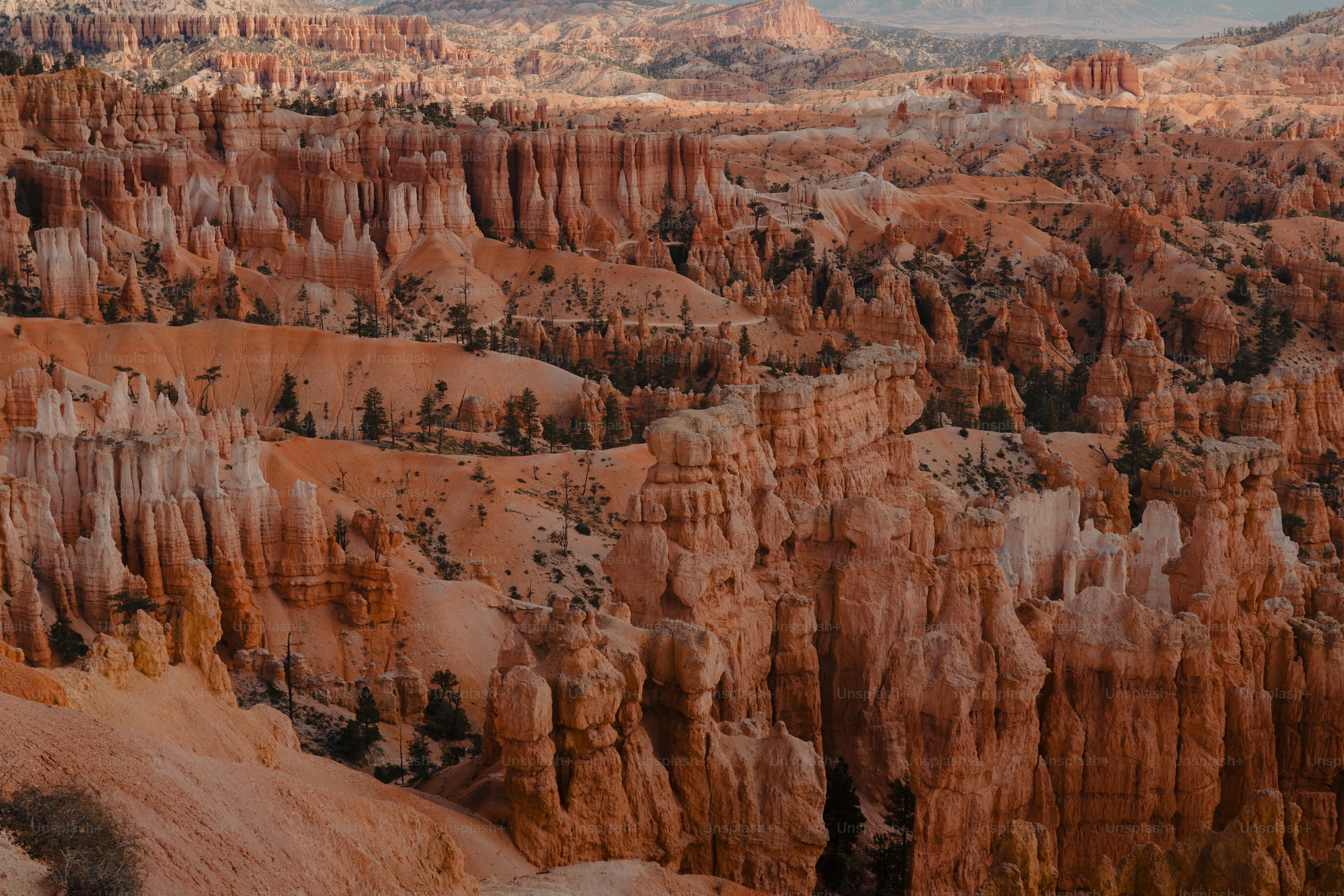 A scenic view of a mountain range in the desert photo – Bryce canyon ...