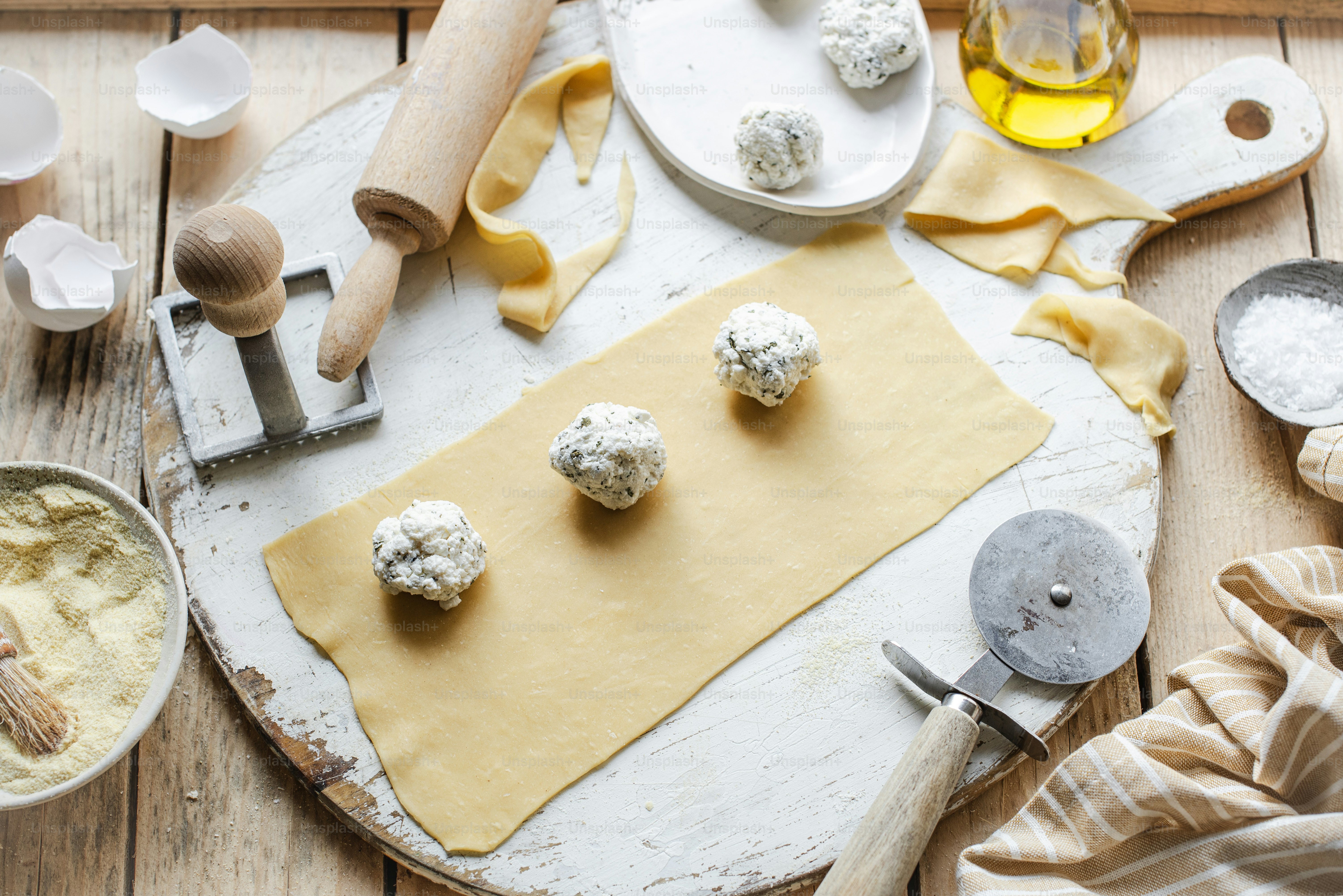 A wooden table topped with different types of food photo – Food styling ...