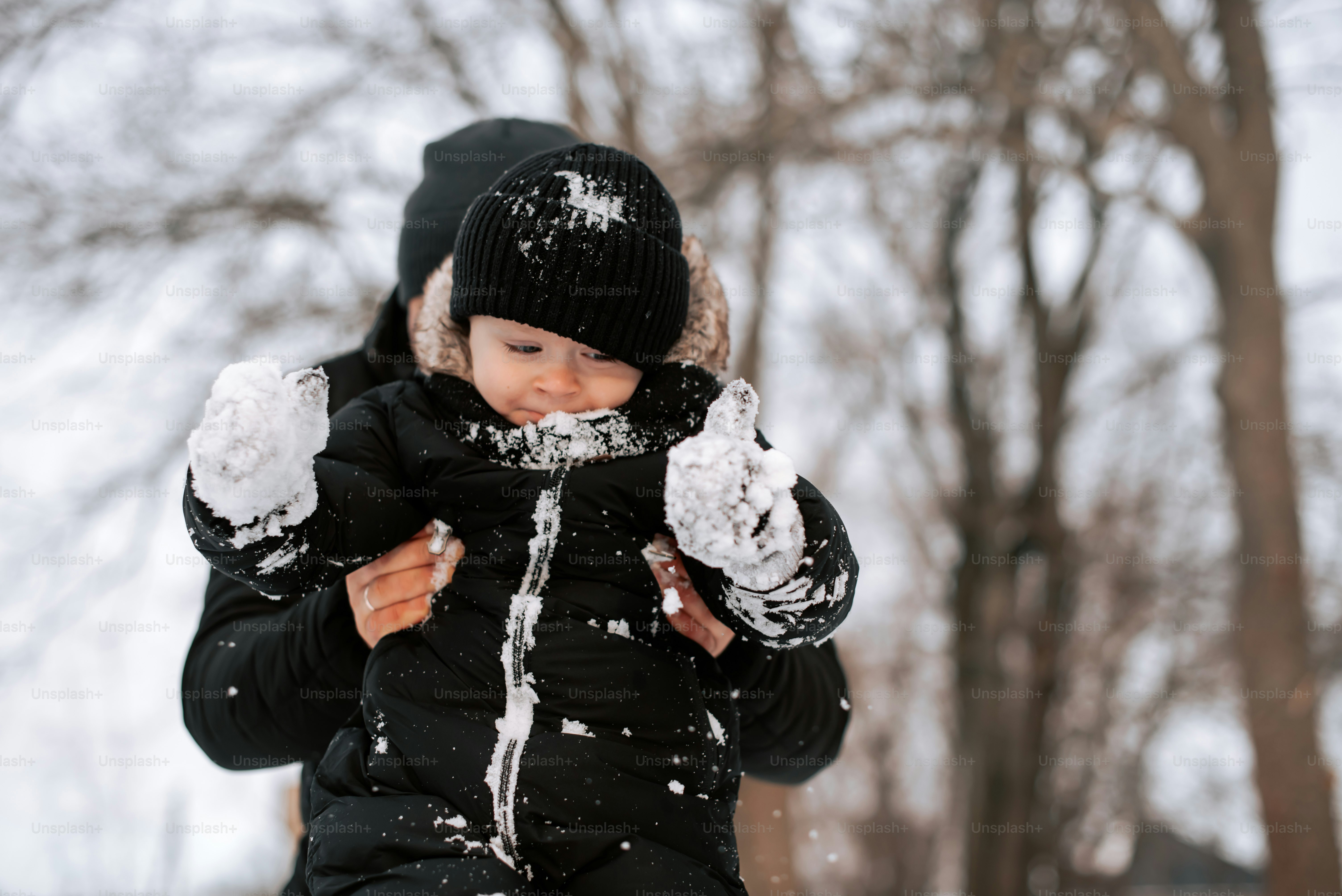 A couple of people that are walking in the snow photo – Family Image on ...