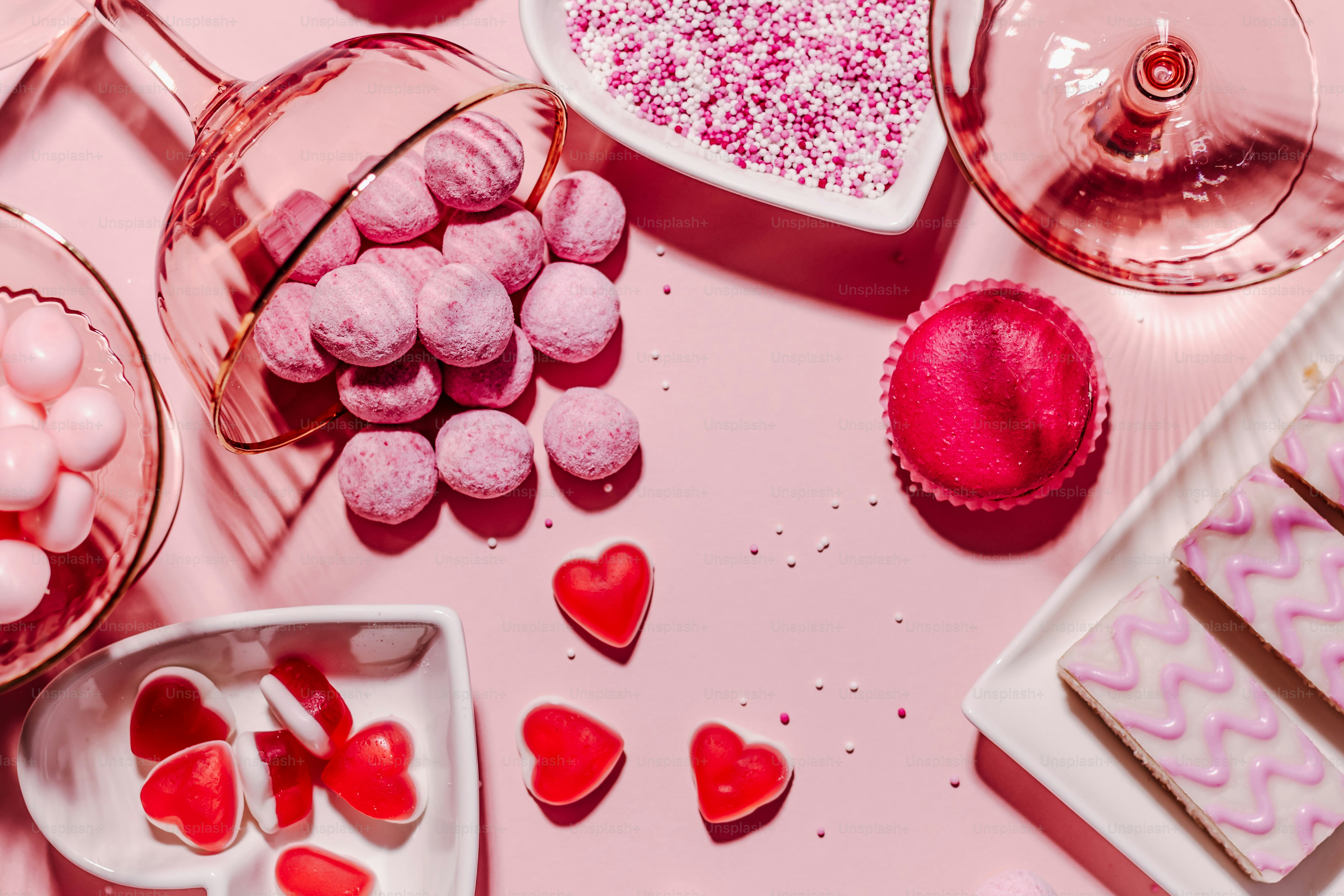 A table topped with lots of different types of desserts photo ...