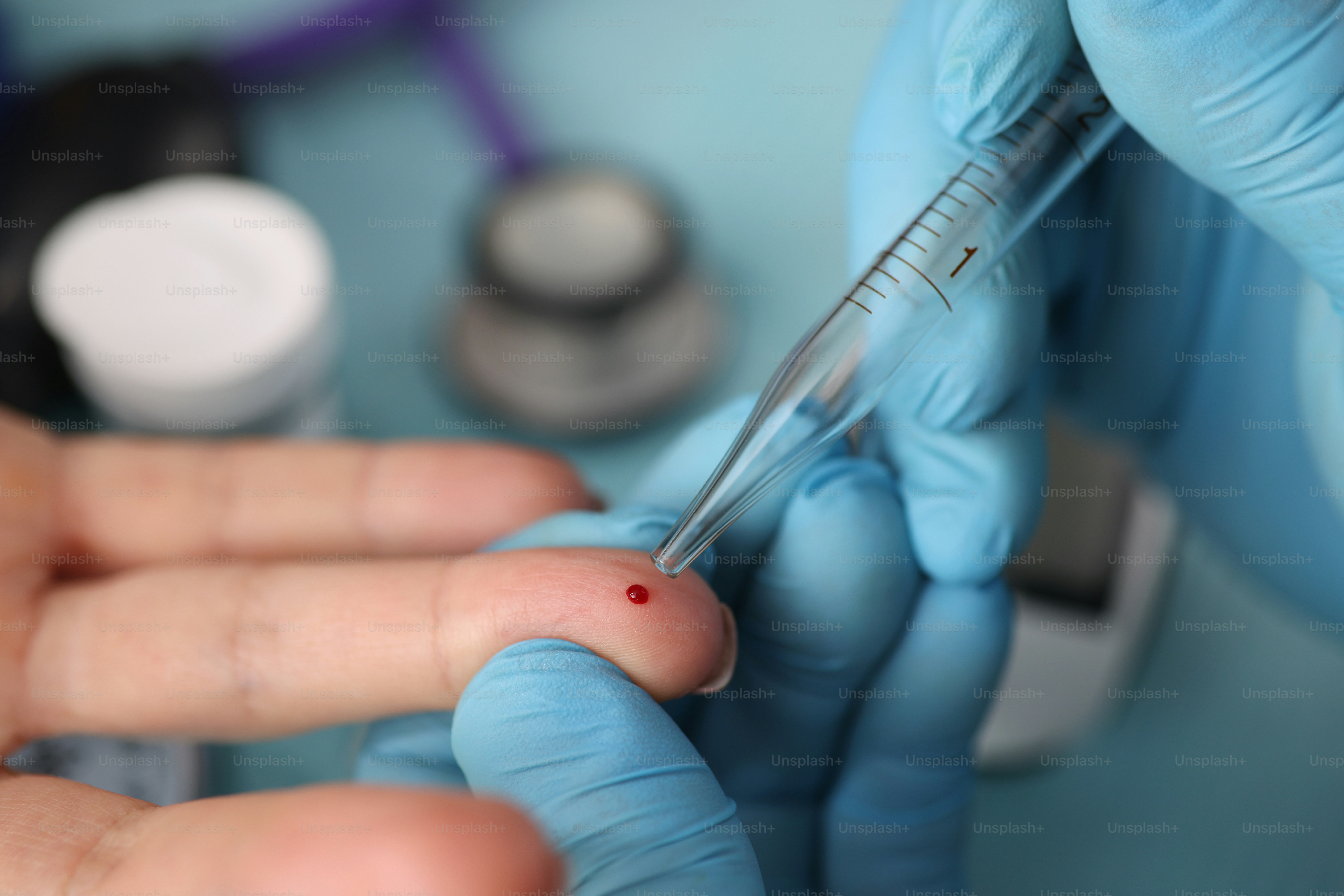 Close-up of doctor take blood of client finger with glass tube, usual ...