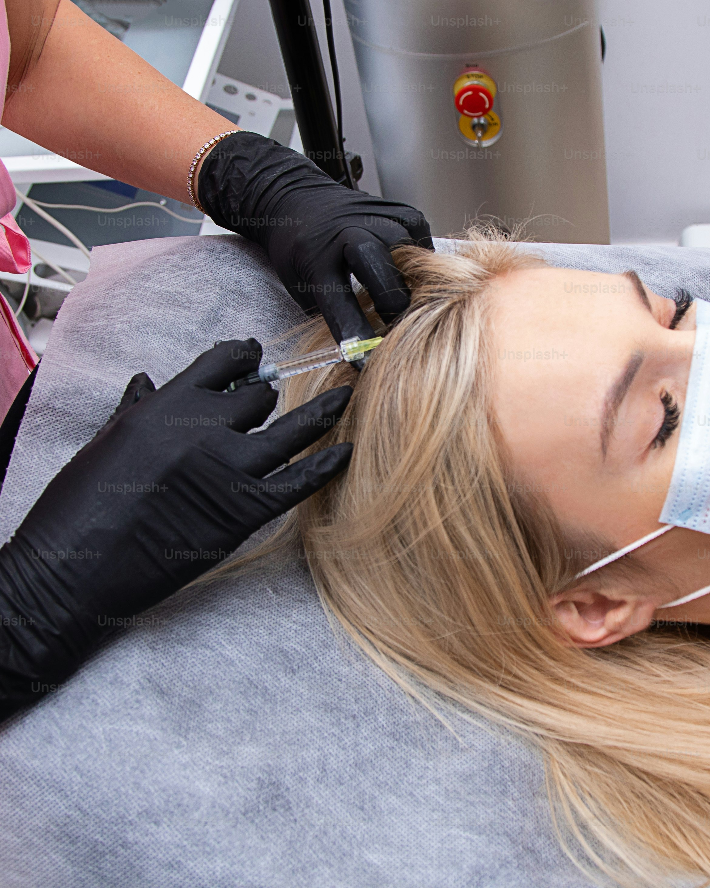 Woman getting injection into scalp, mesotherapy, hair loss therapy ...