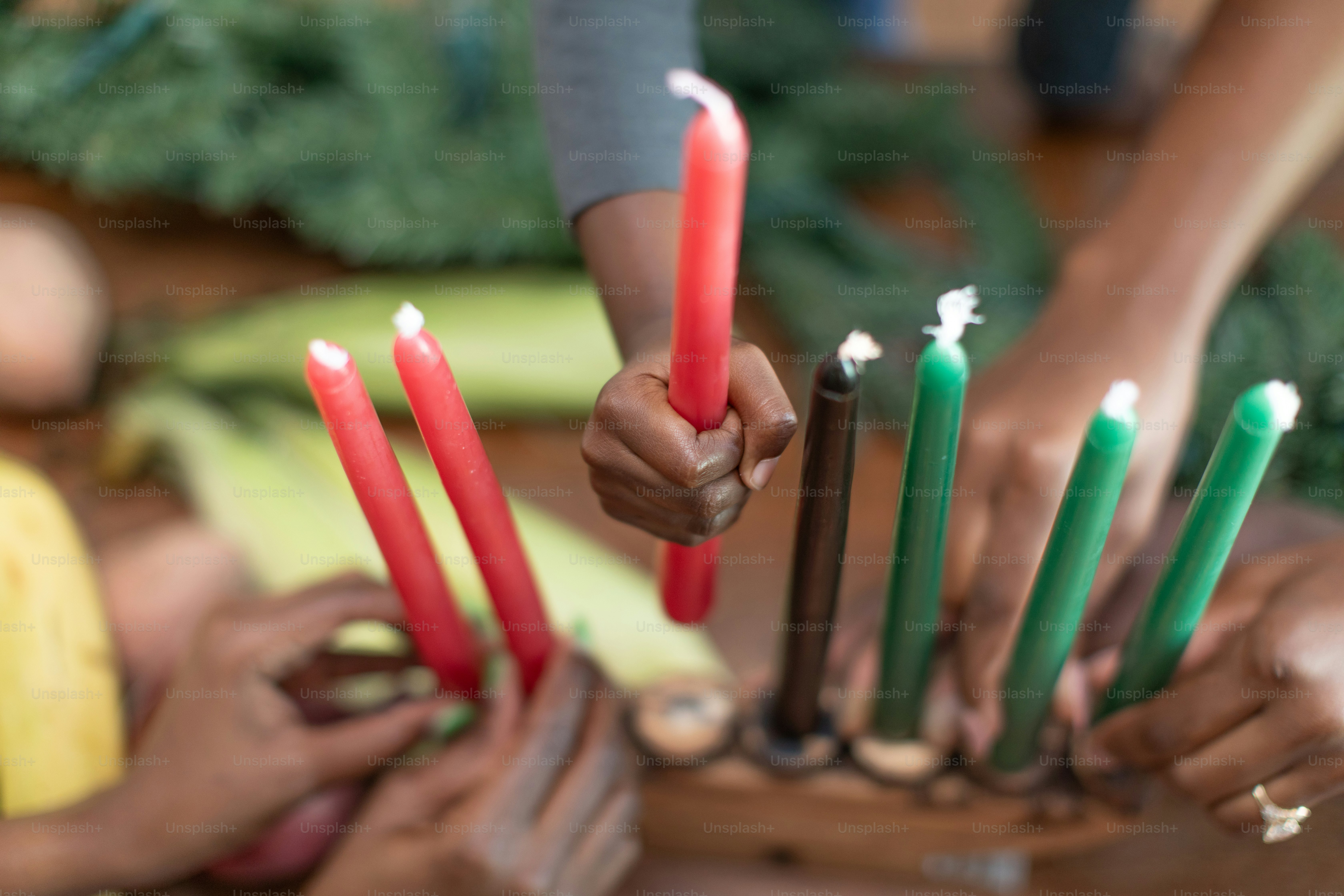 A group of people holding candles in their hands photo – Holiday Image ...