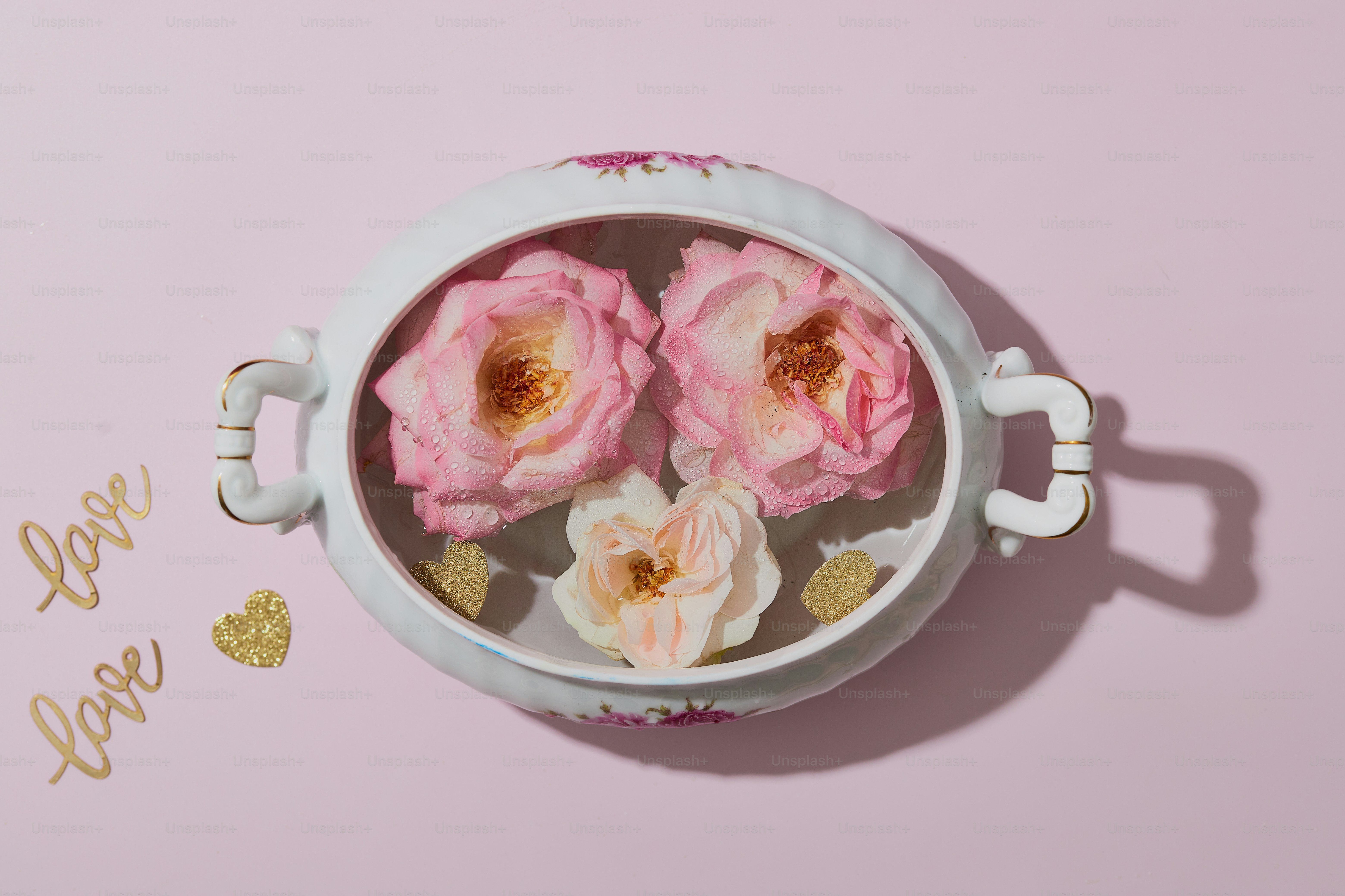 Three pink roses are in a white cup photo – Valentines day Image on ...