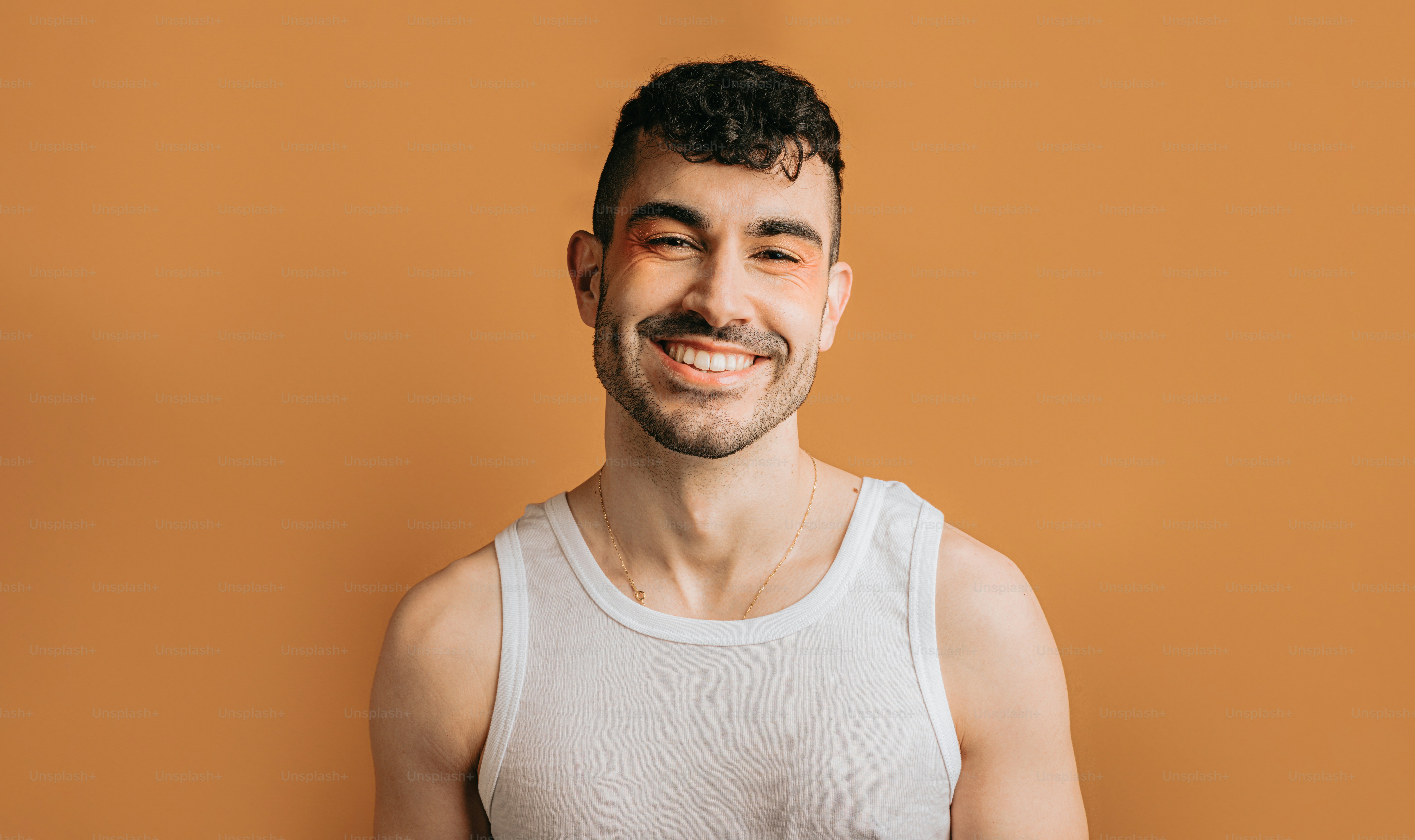 A man with a smile on his face photo – Male Image on Unsplash