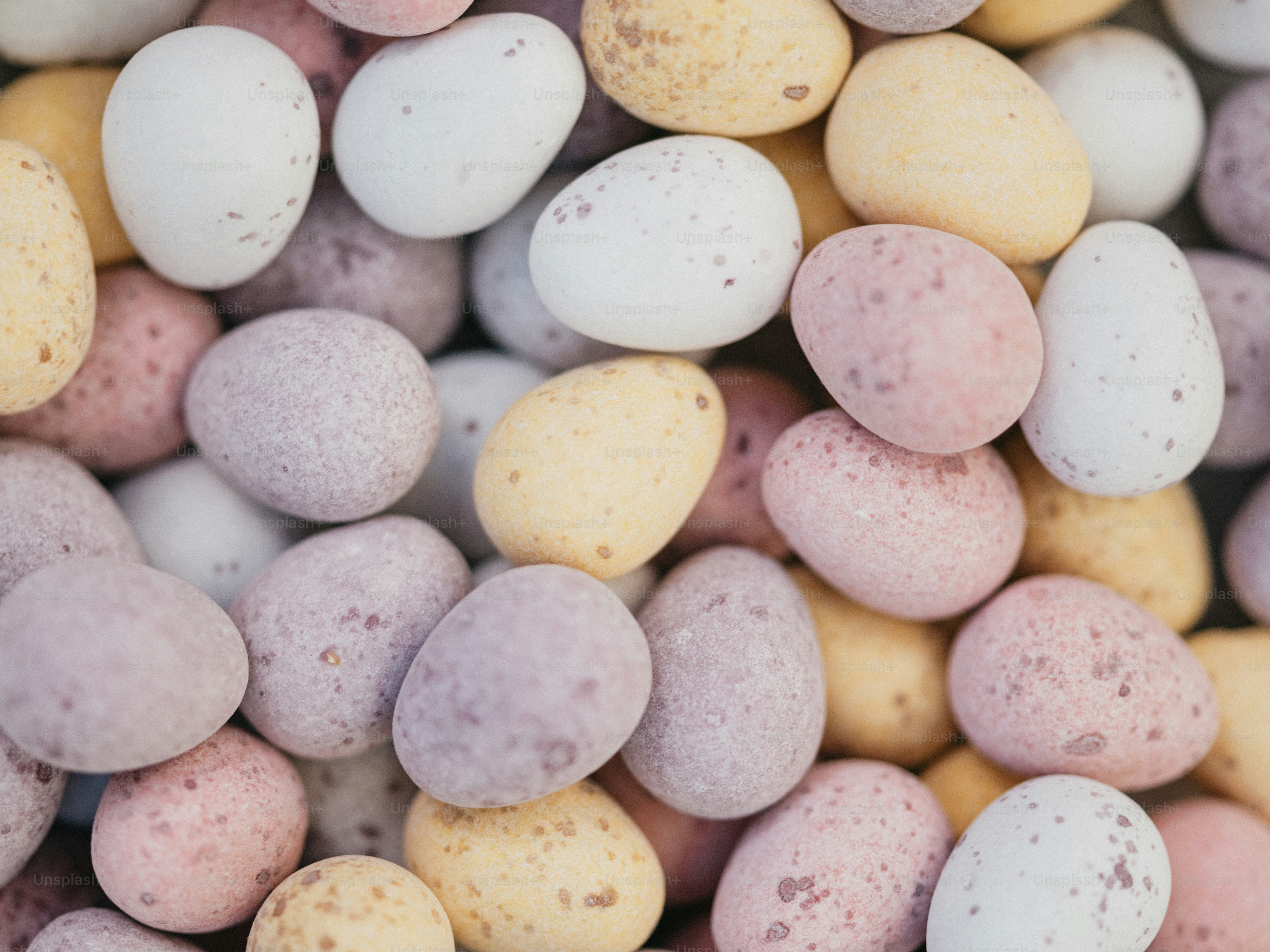 A close up of a pile of candy eggs photo – Easter Image on Unsplash
