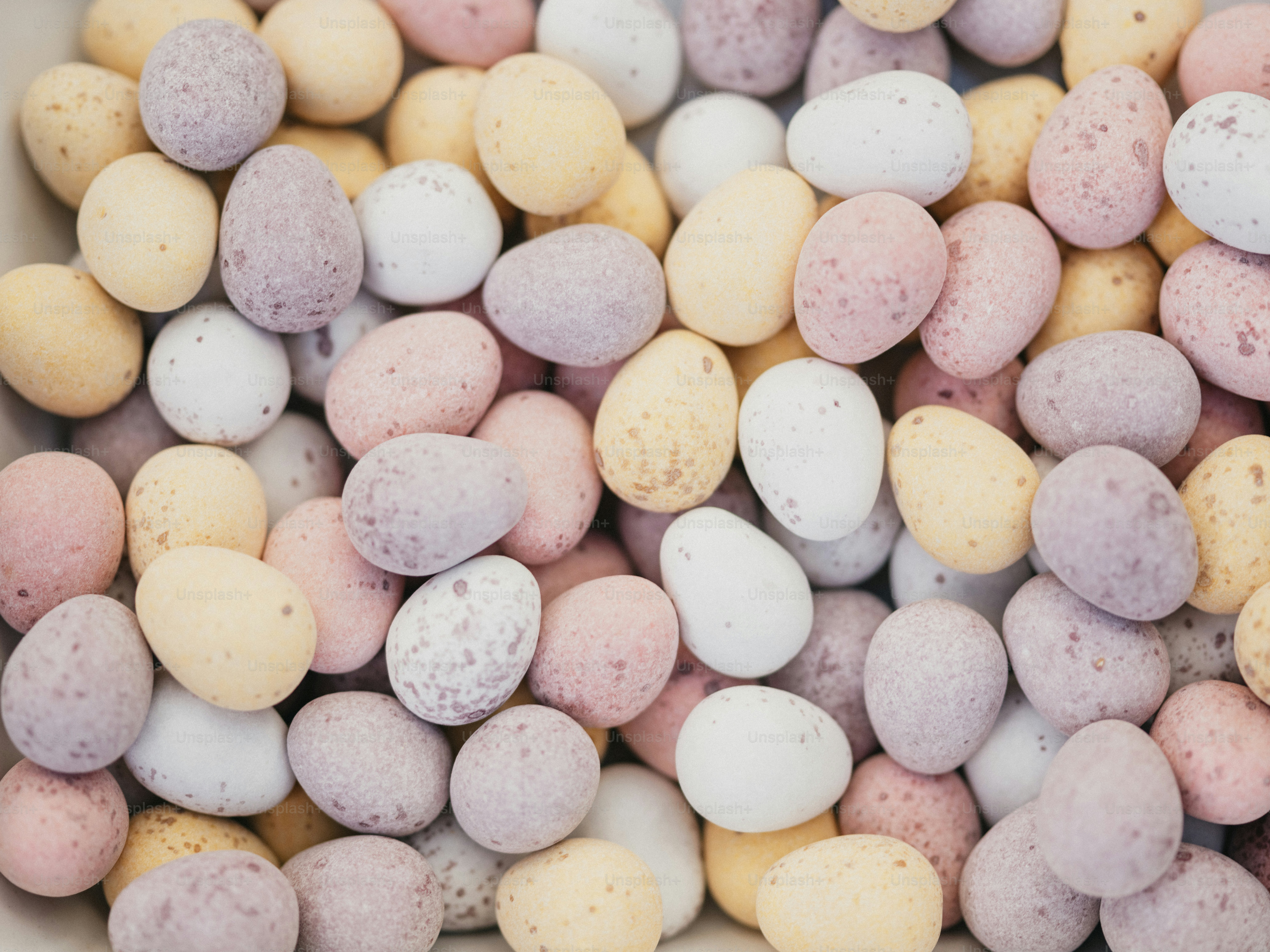 A close up of a pile of candy eggs photo – Easter Image on Unsplash