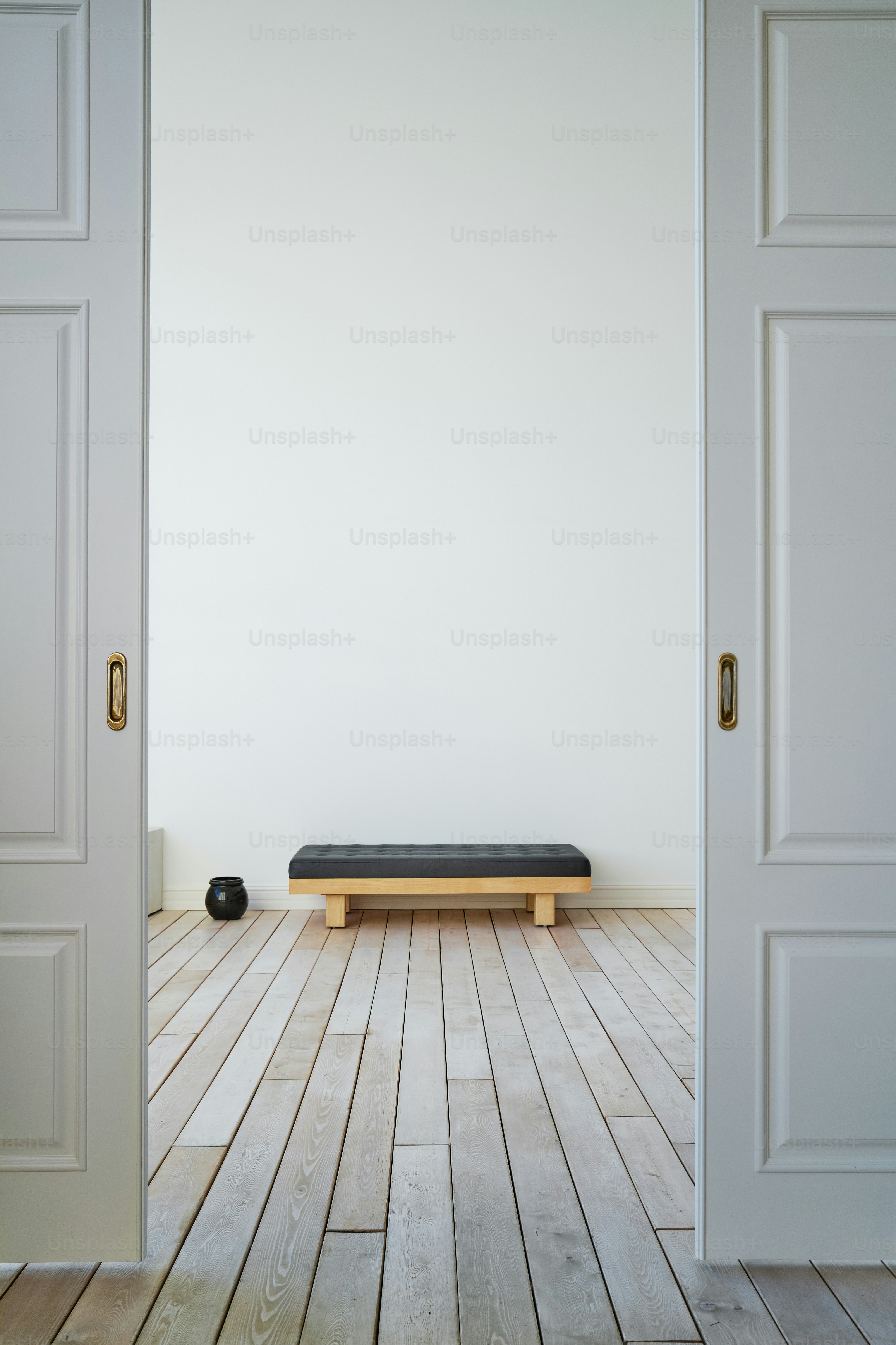 A wooden bench sitting on top of a hard wood floor photo – Chair Image ...