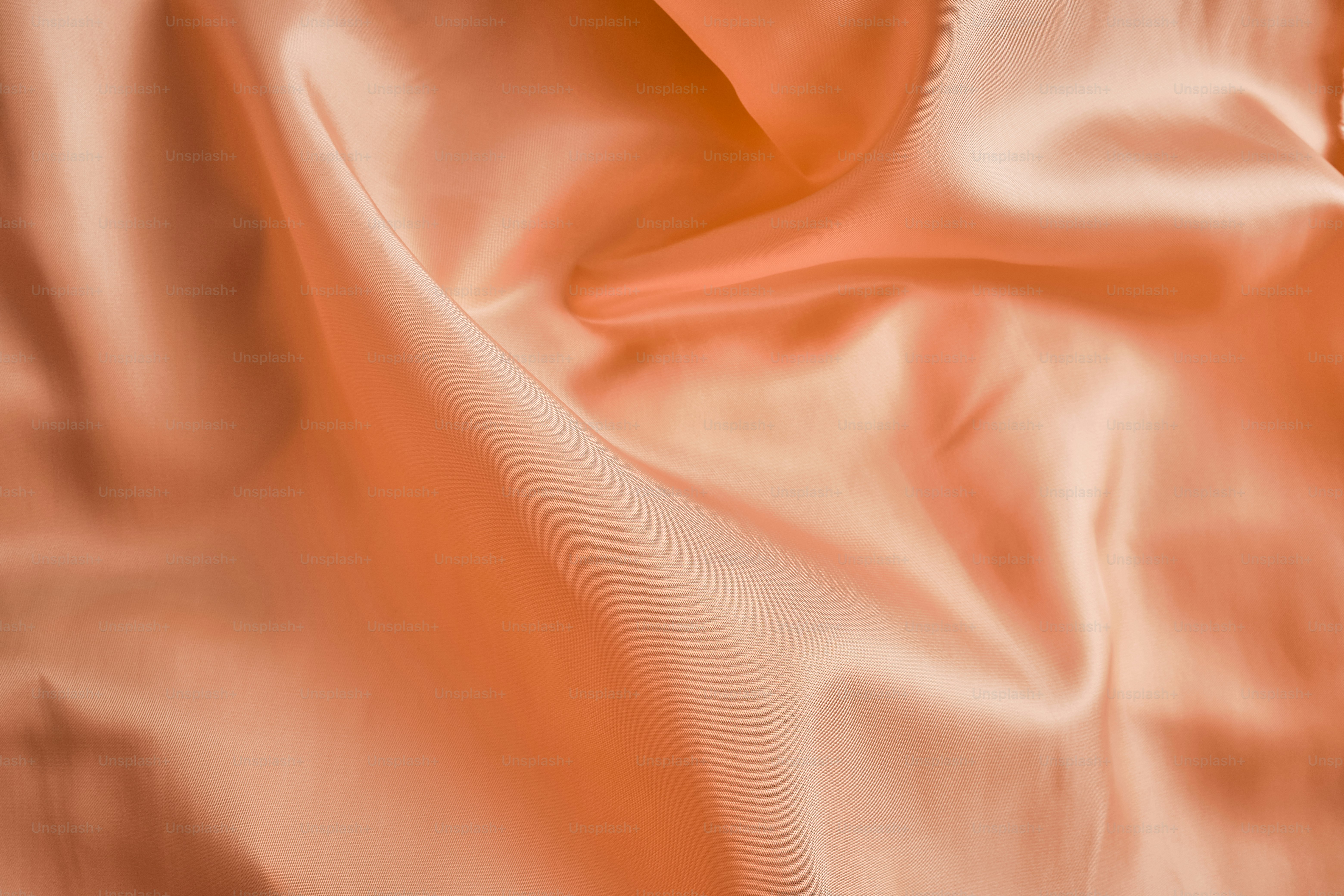 A close up of a peach colored fabric photo – Peach fuzz Image on Unsplash