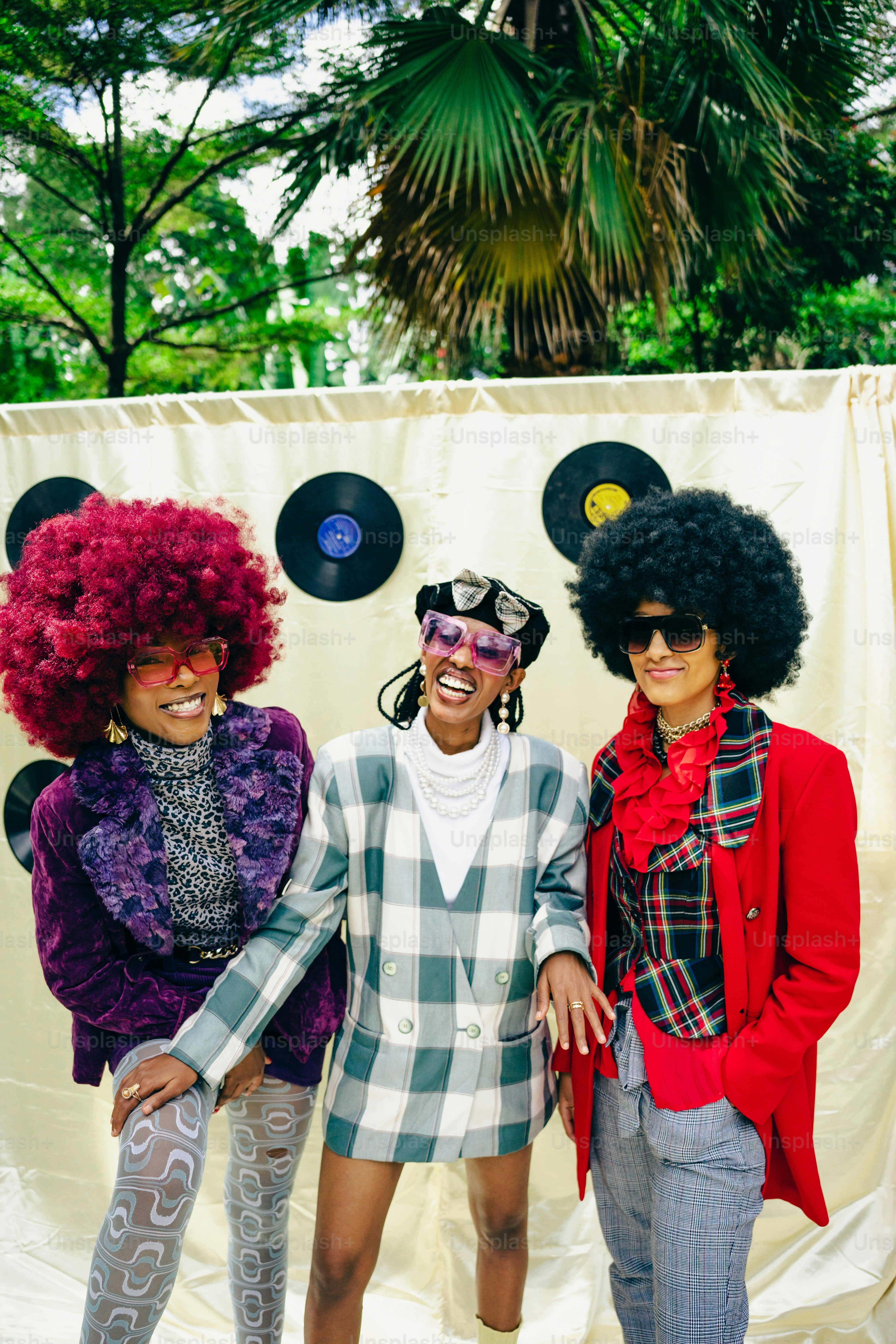 A group of three women standing next to each other photo – Seventies ...