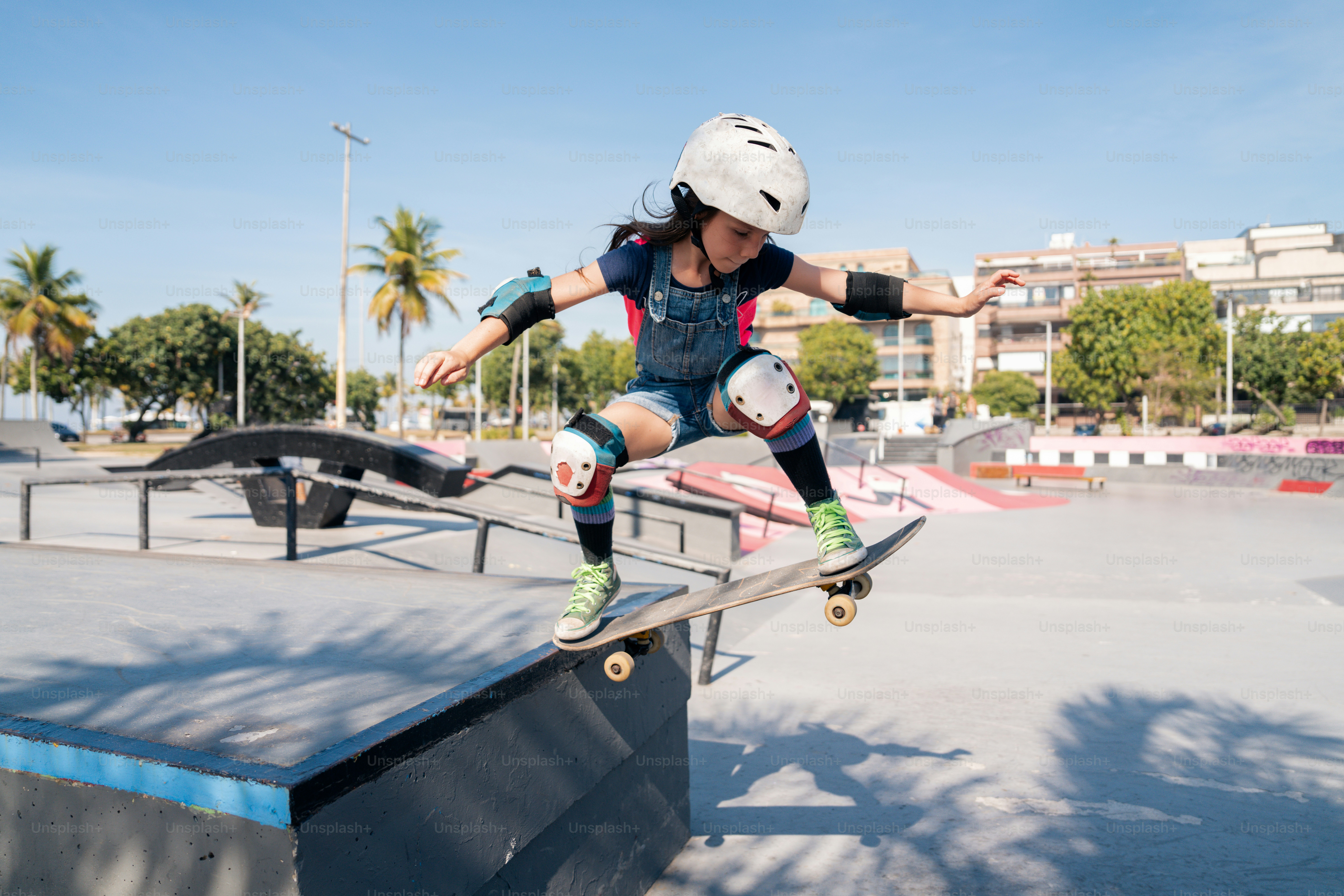 A person riding a skate board at a skate park photo – Skating Image on ...