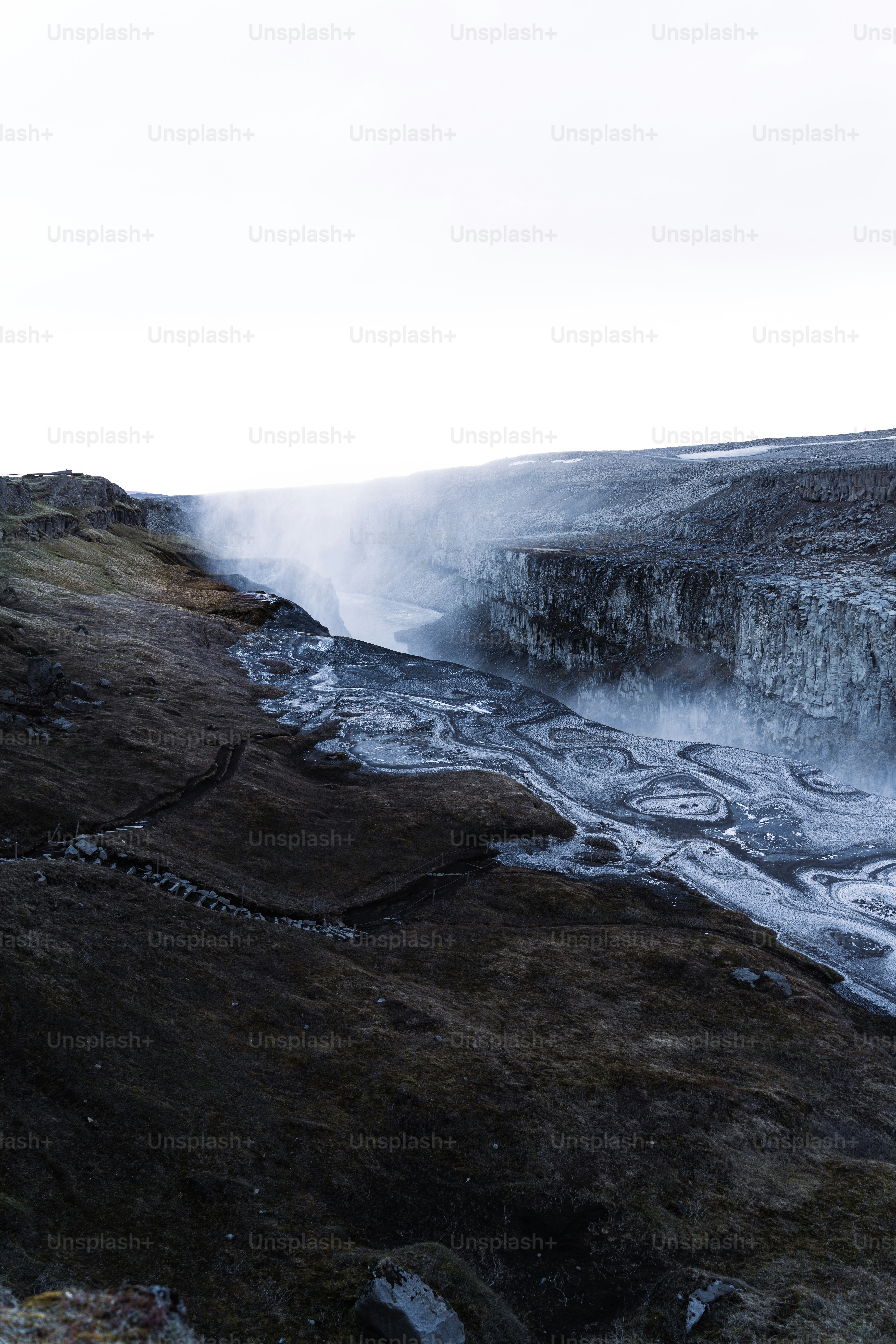 A large geyser spewing out water into the sky photo – Earth Image on ...