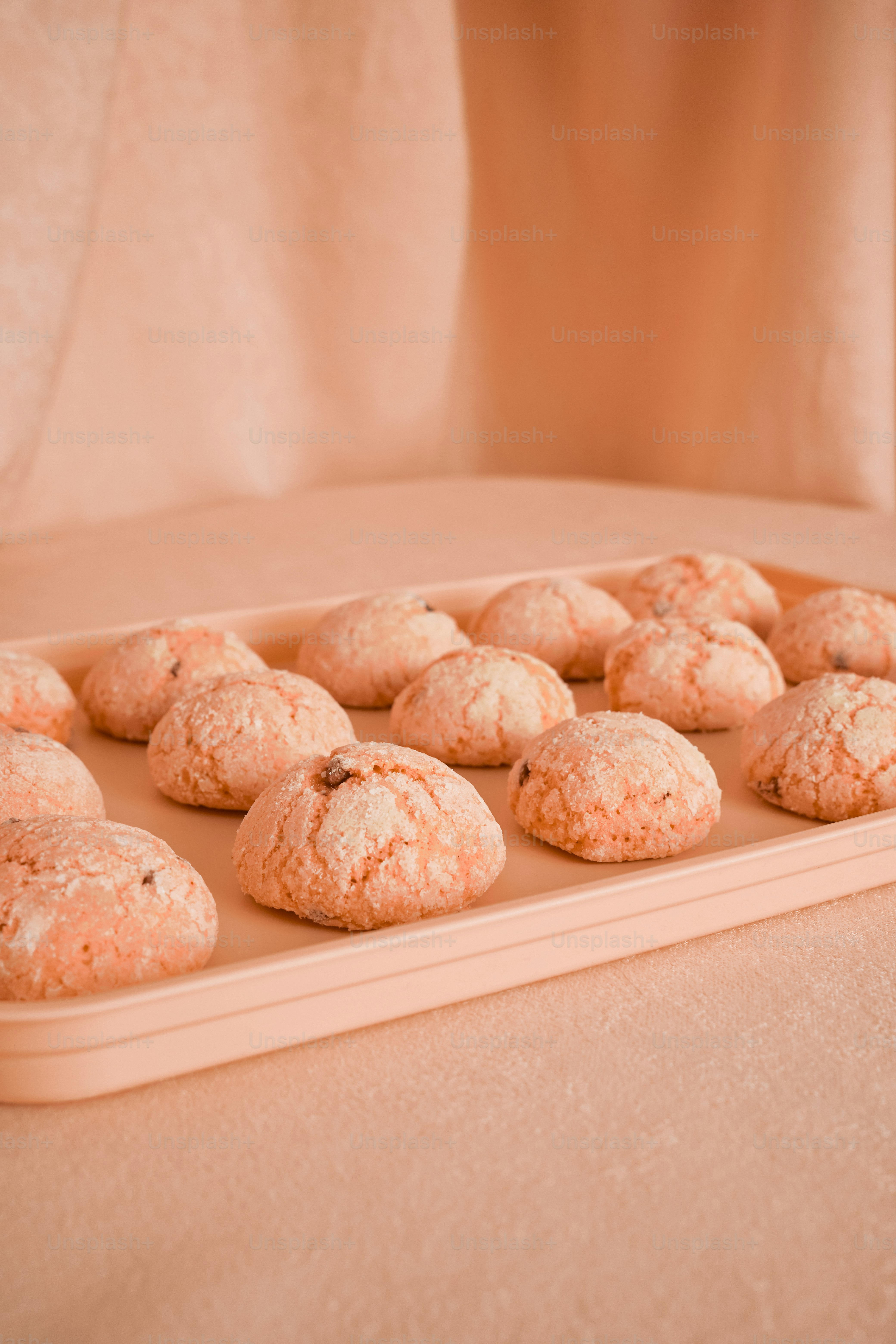 A tray of cookies sitting on top of a table photo – Pantone Image on ...