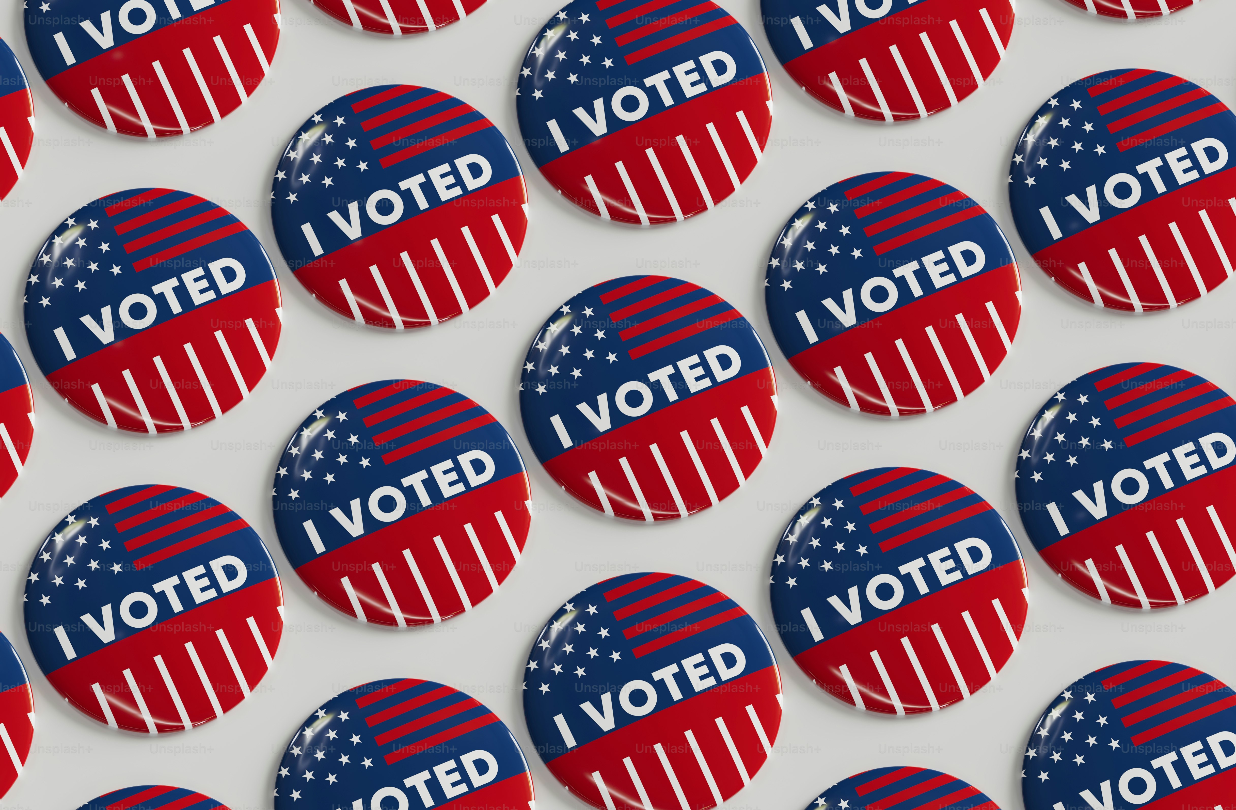 A group of buttons with the word vote written on them photo – 2024 ...