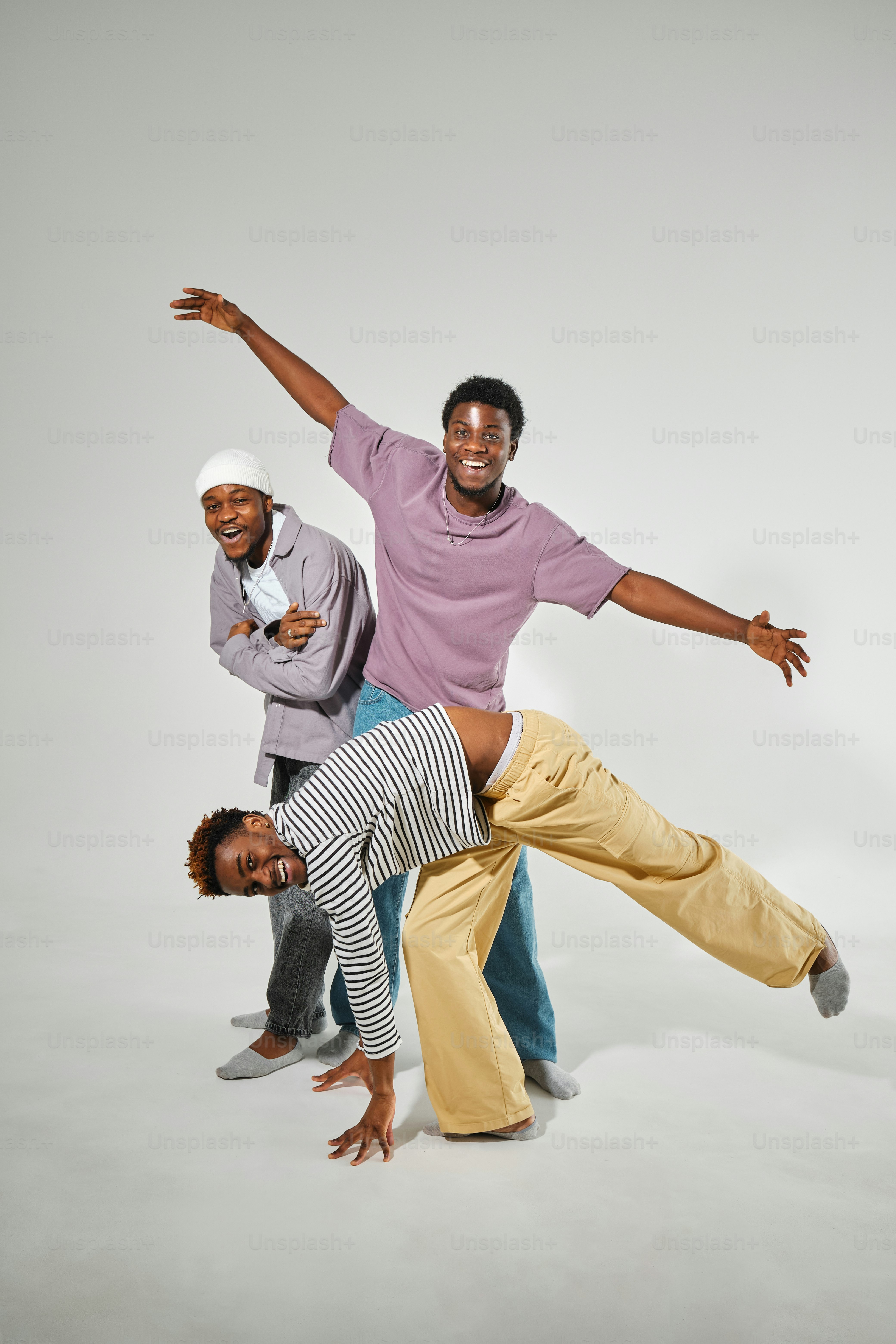 A group of three men standing next to each other photo – Brotherhood ...