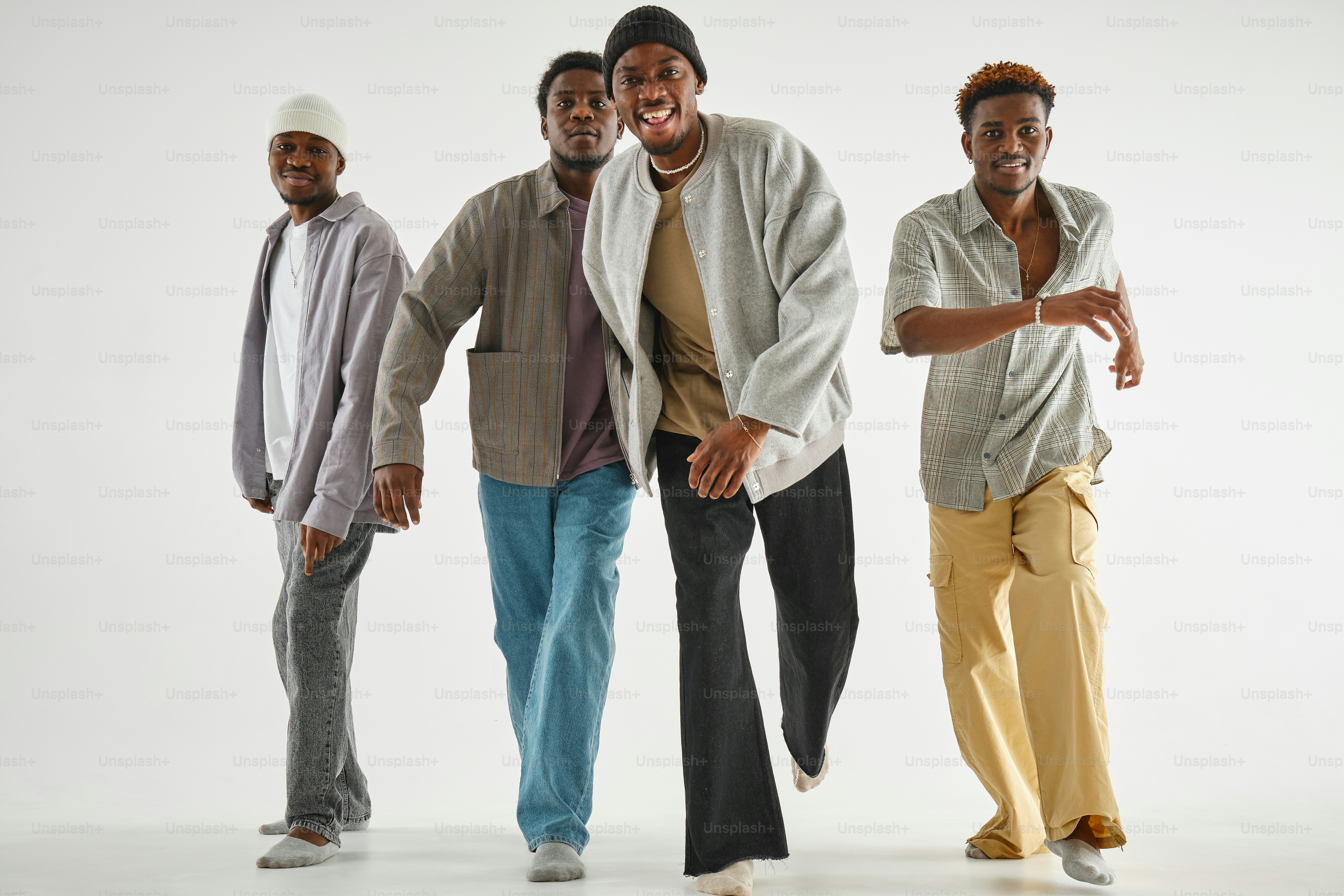 A group of three men standing next to each other photo – Fraternity ...