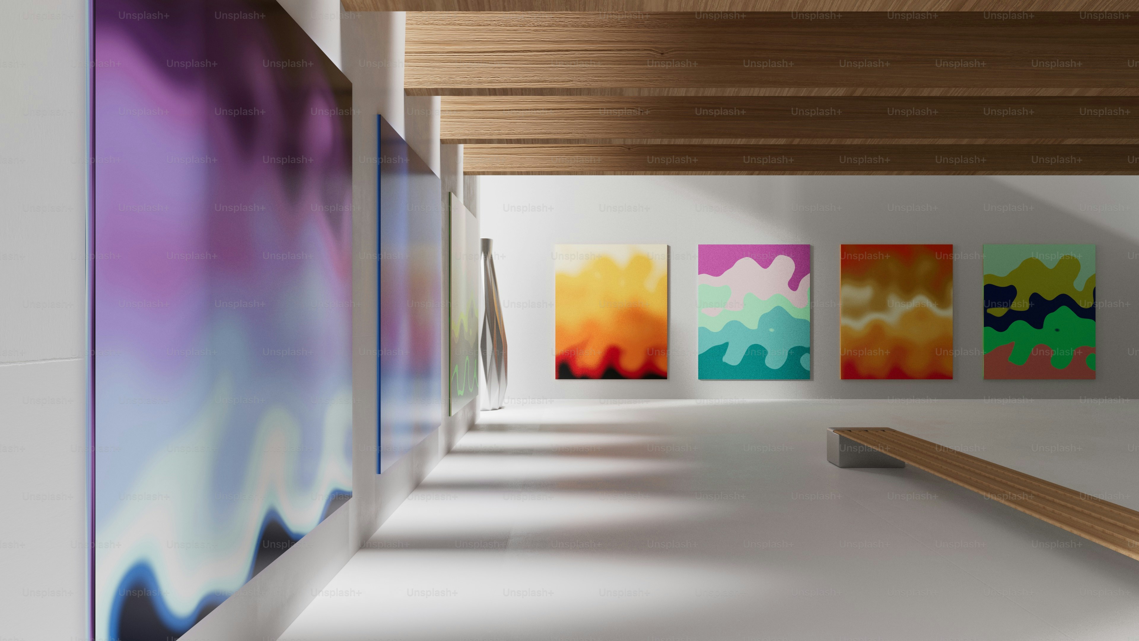 A long hallway with paintings on the wall photo – Art gallery Image on ...