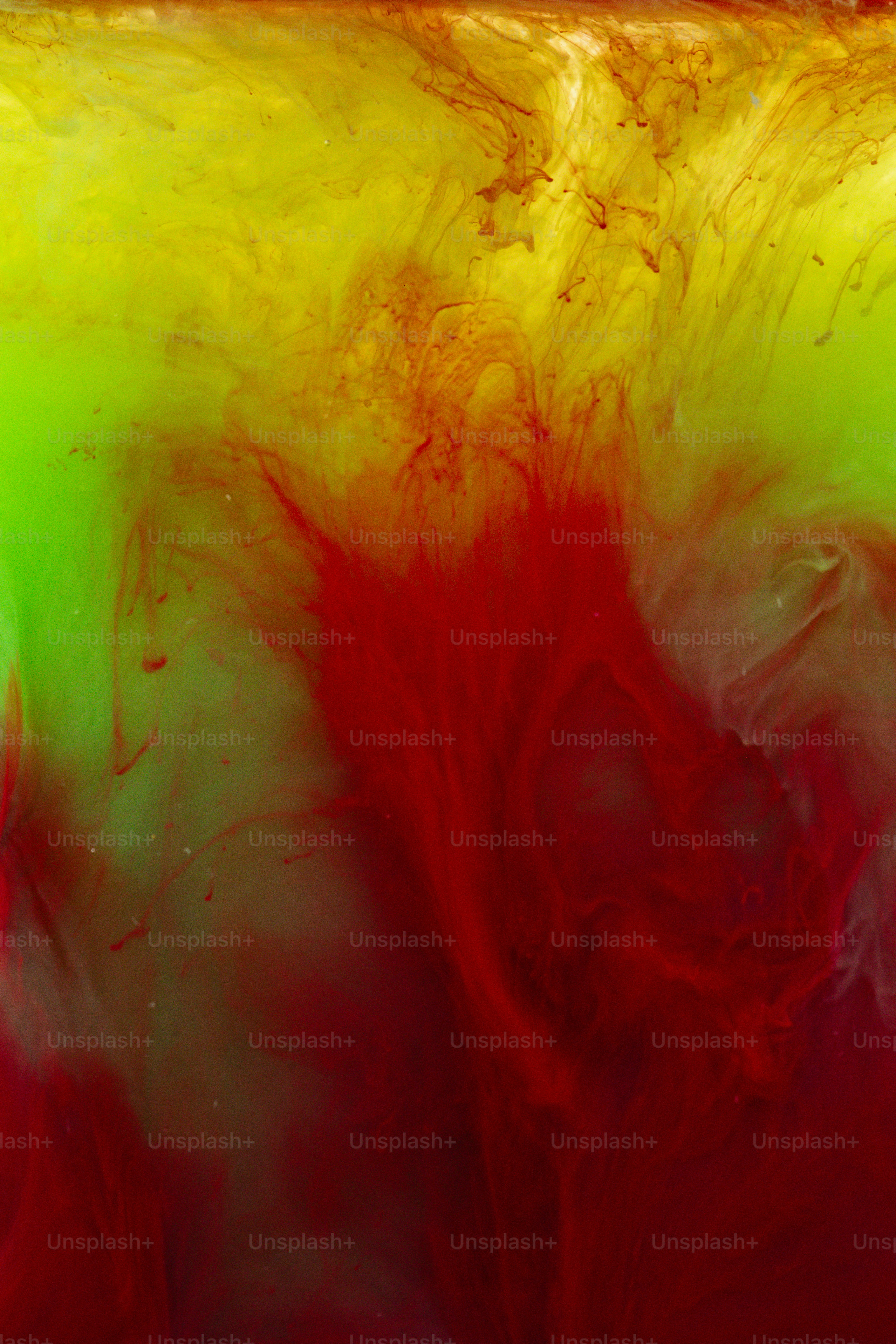 A red and yellow substance is in the water photo – Background Image on ...