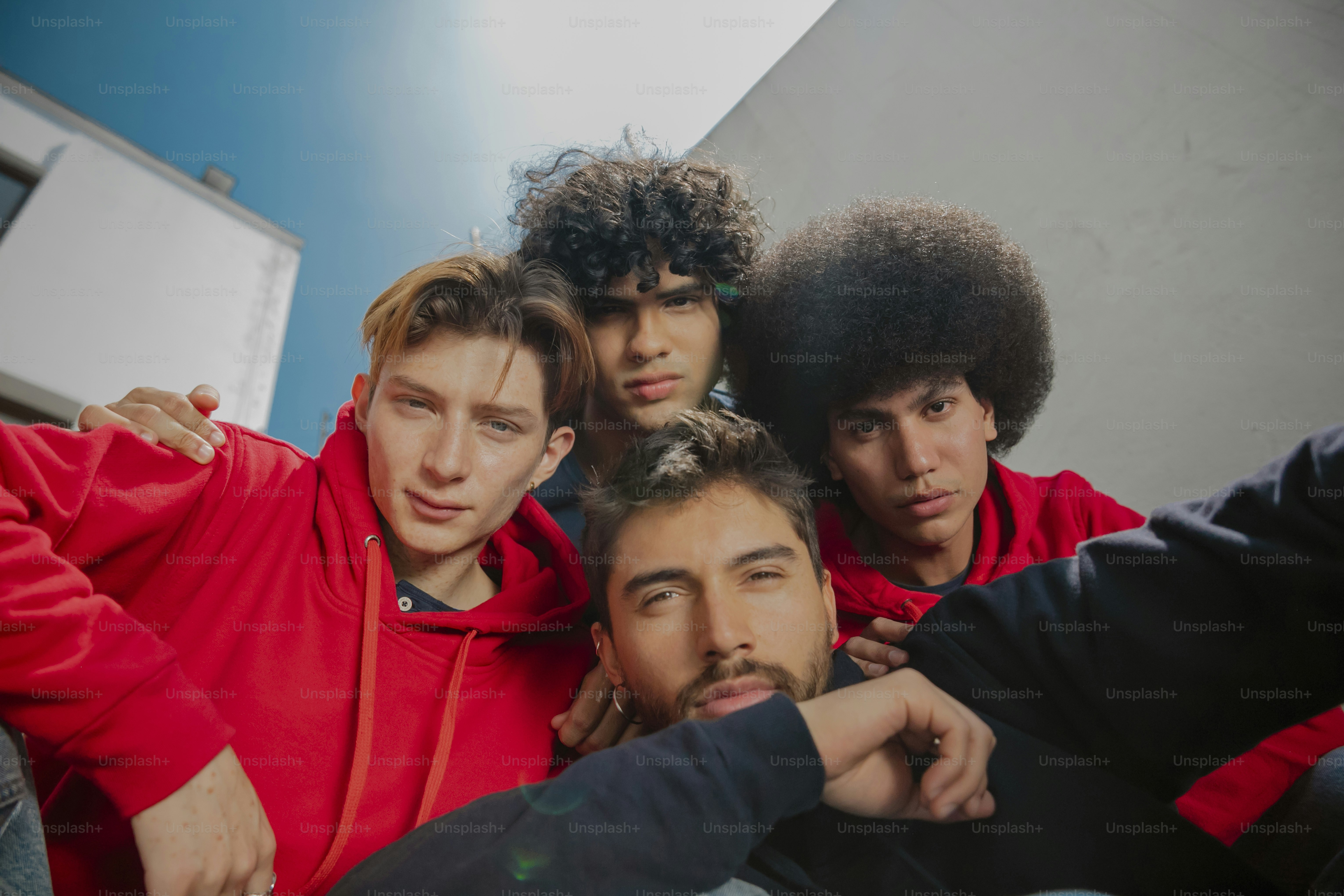 A group of young men standing next to each other photo – Fellowship ...