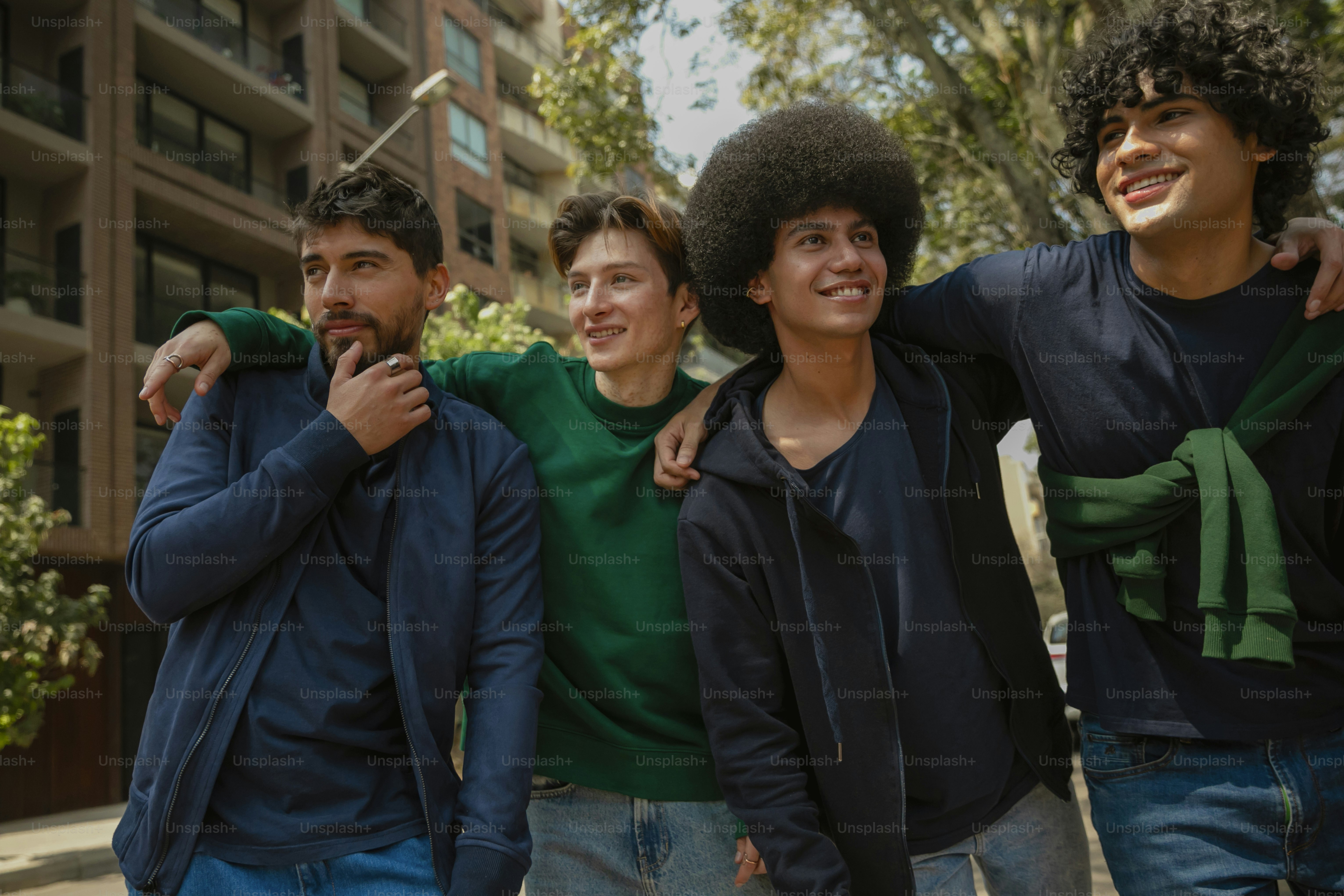 A group of young men standing next to each other photo – Fellowship ...