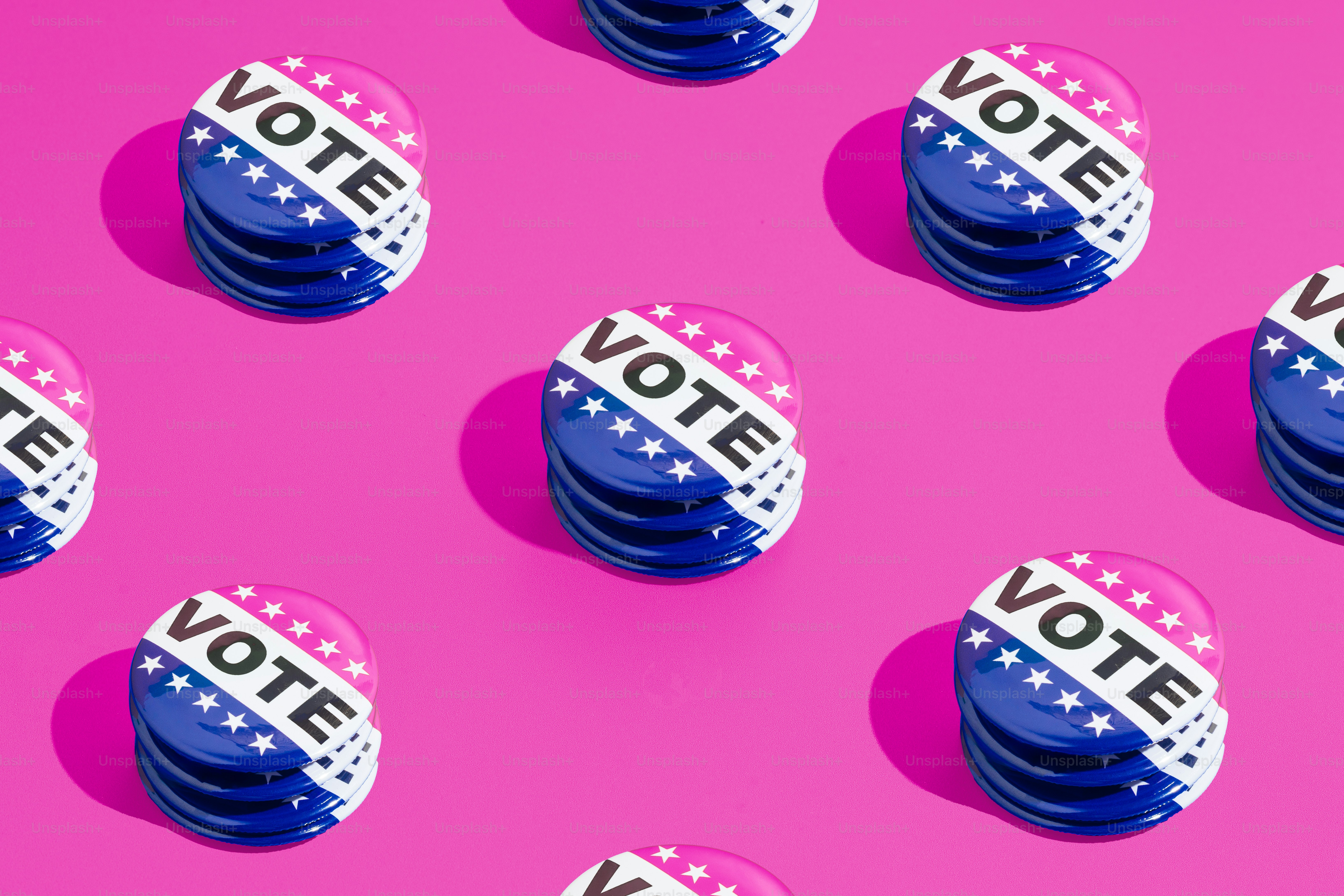 A group of buttons with the words vote on them photo – Us elections ...