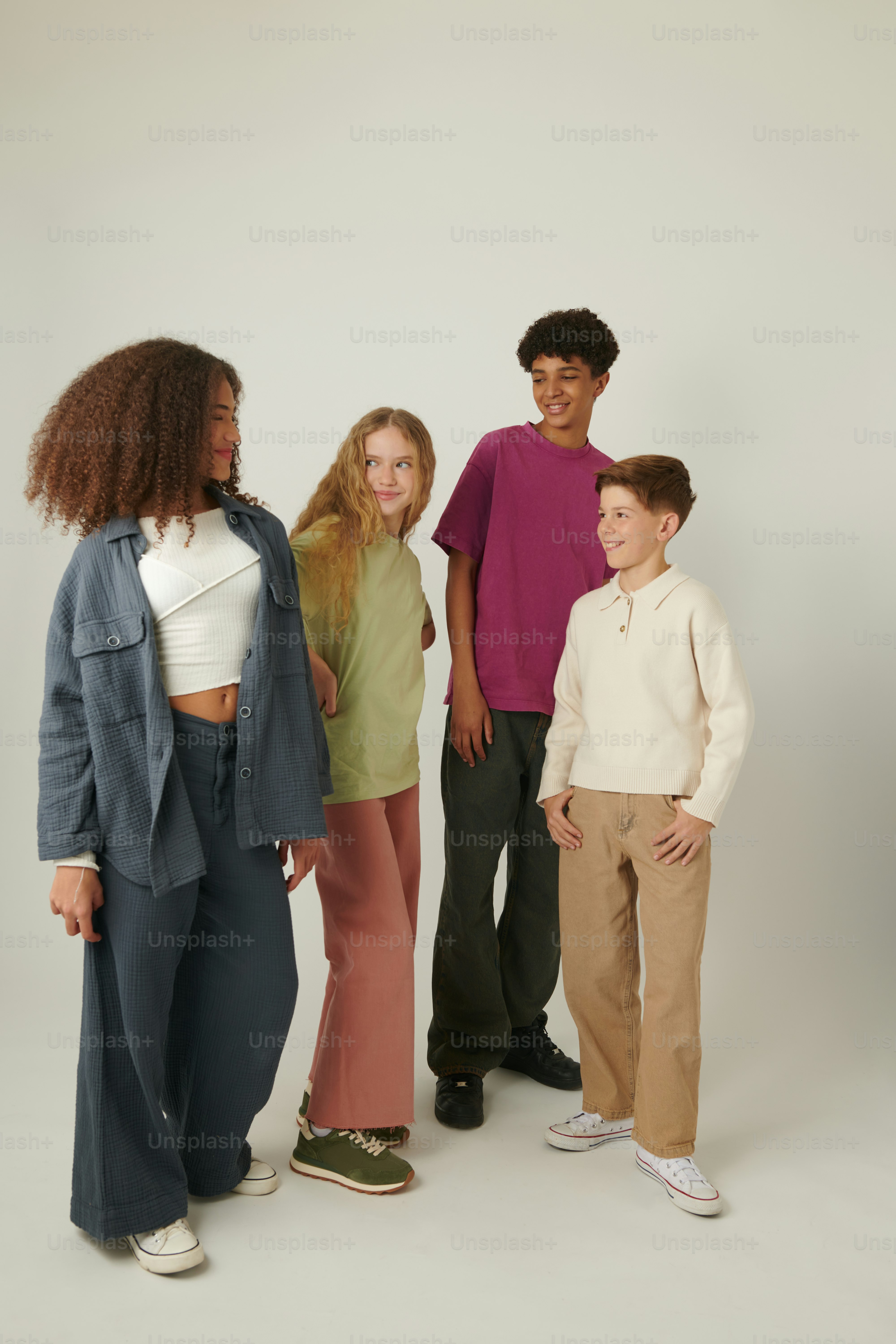 A group of people standing next to each other photo – Hula hooping ...